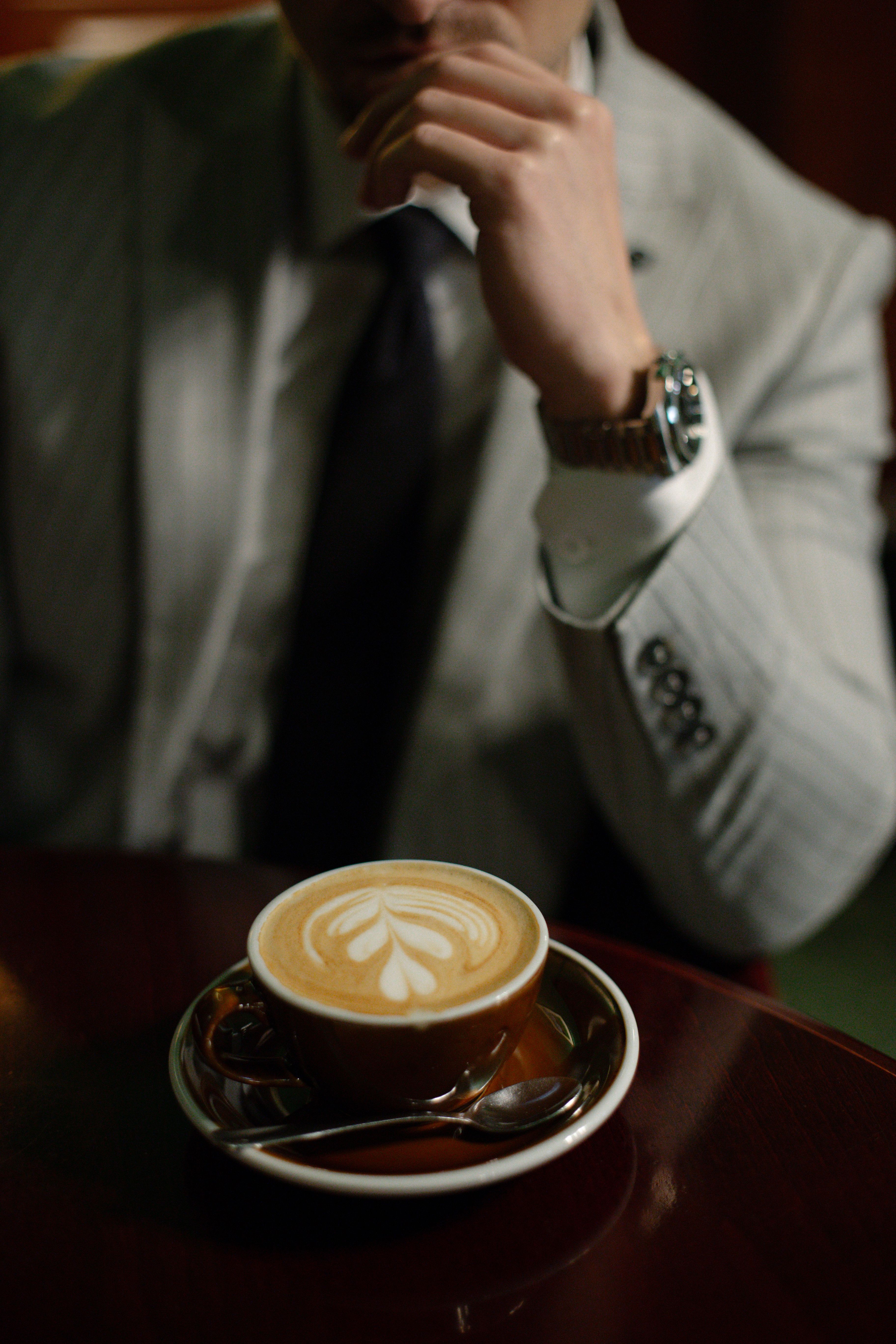 Elegant Gentleman Enjoying a Latte in Slovakia · Free Stock Photo
