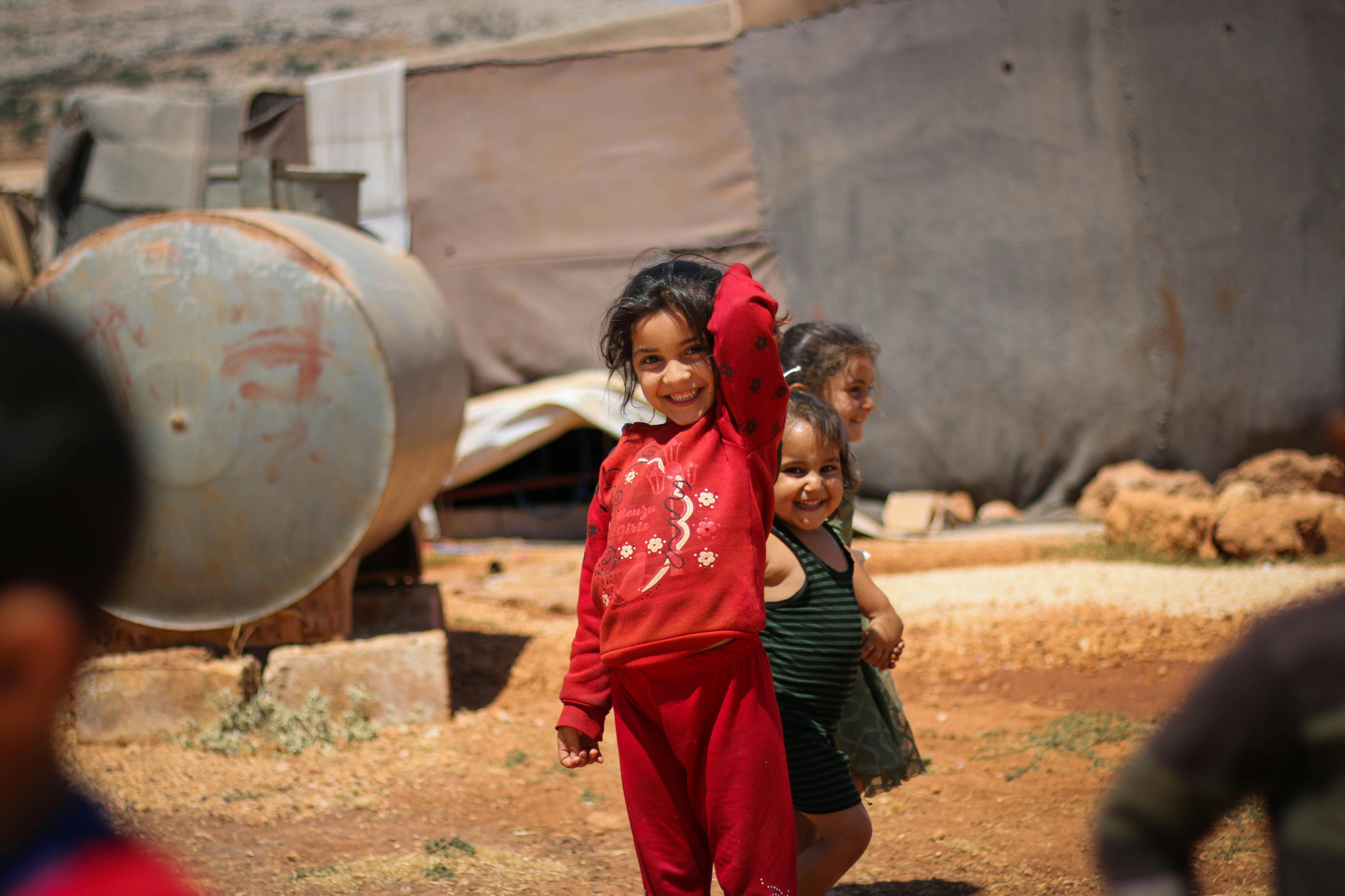 Children Playing Outdoors in Syrian Refugee Camp · Free Stock Photo