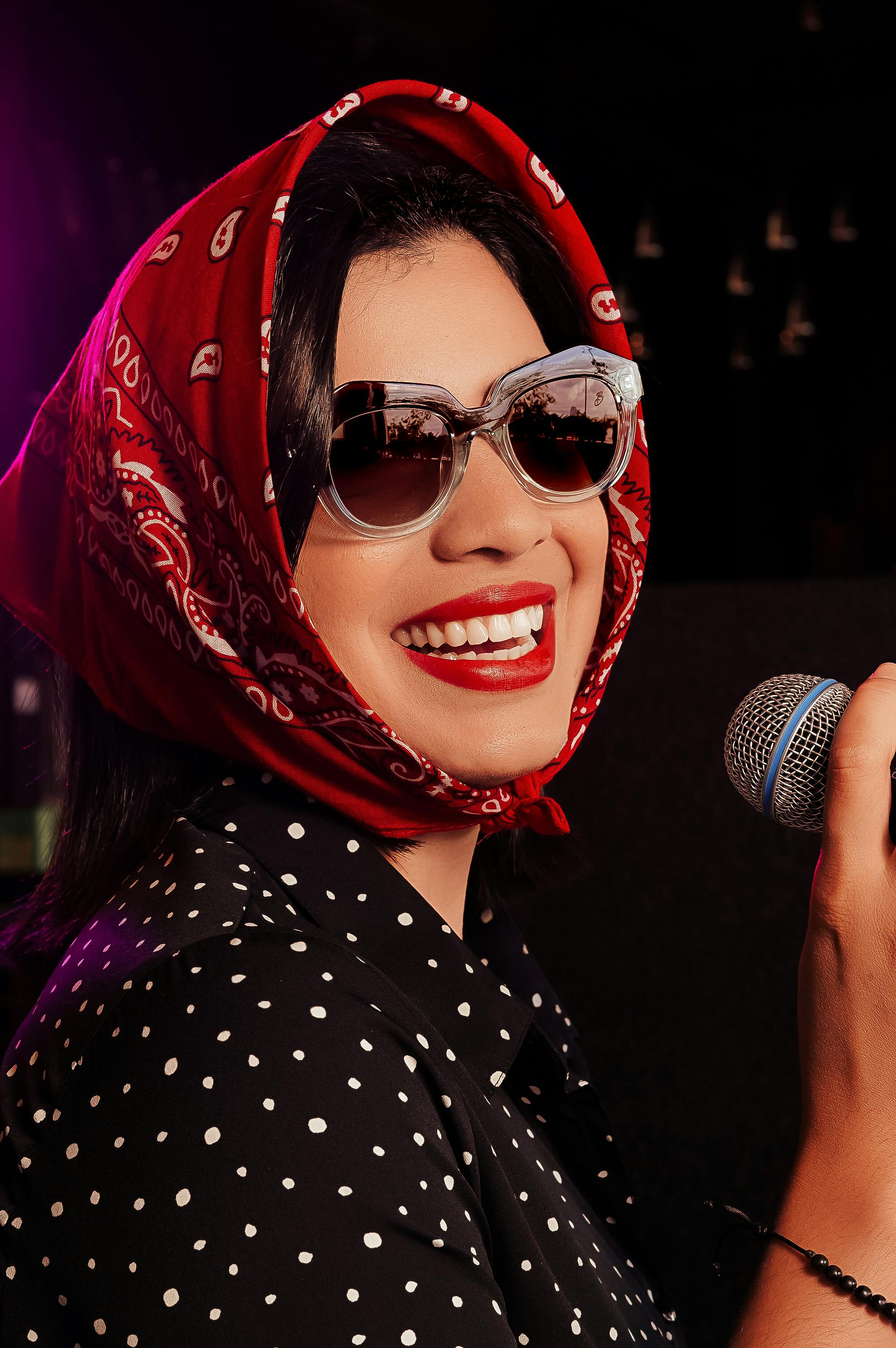 Vintage-Style Portrait of Singer with Microphone · Free Stock Photo