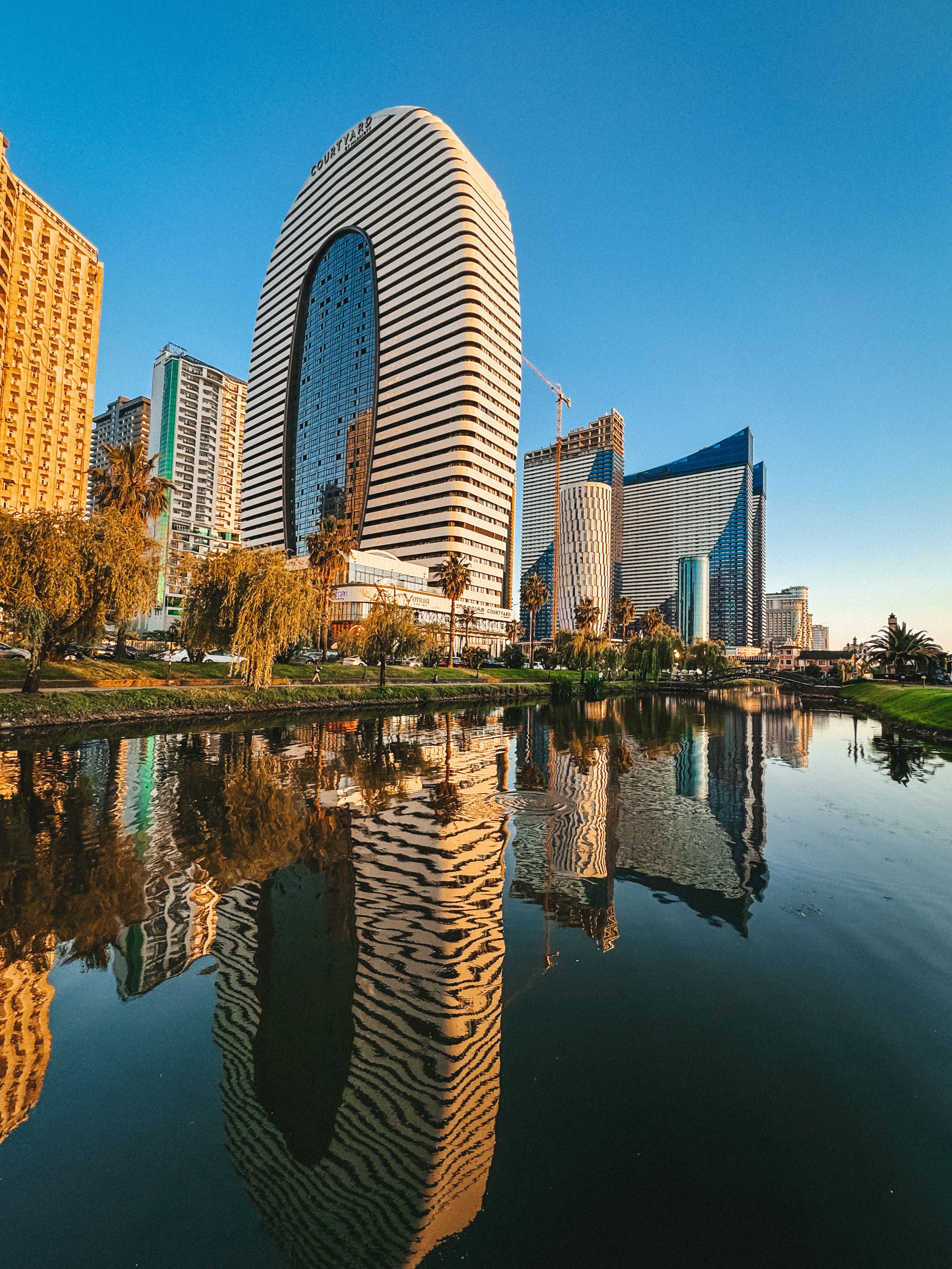 Modern Architectural Skyline Reflection · Free Stock Photo