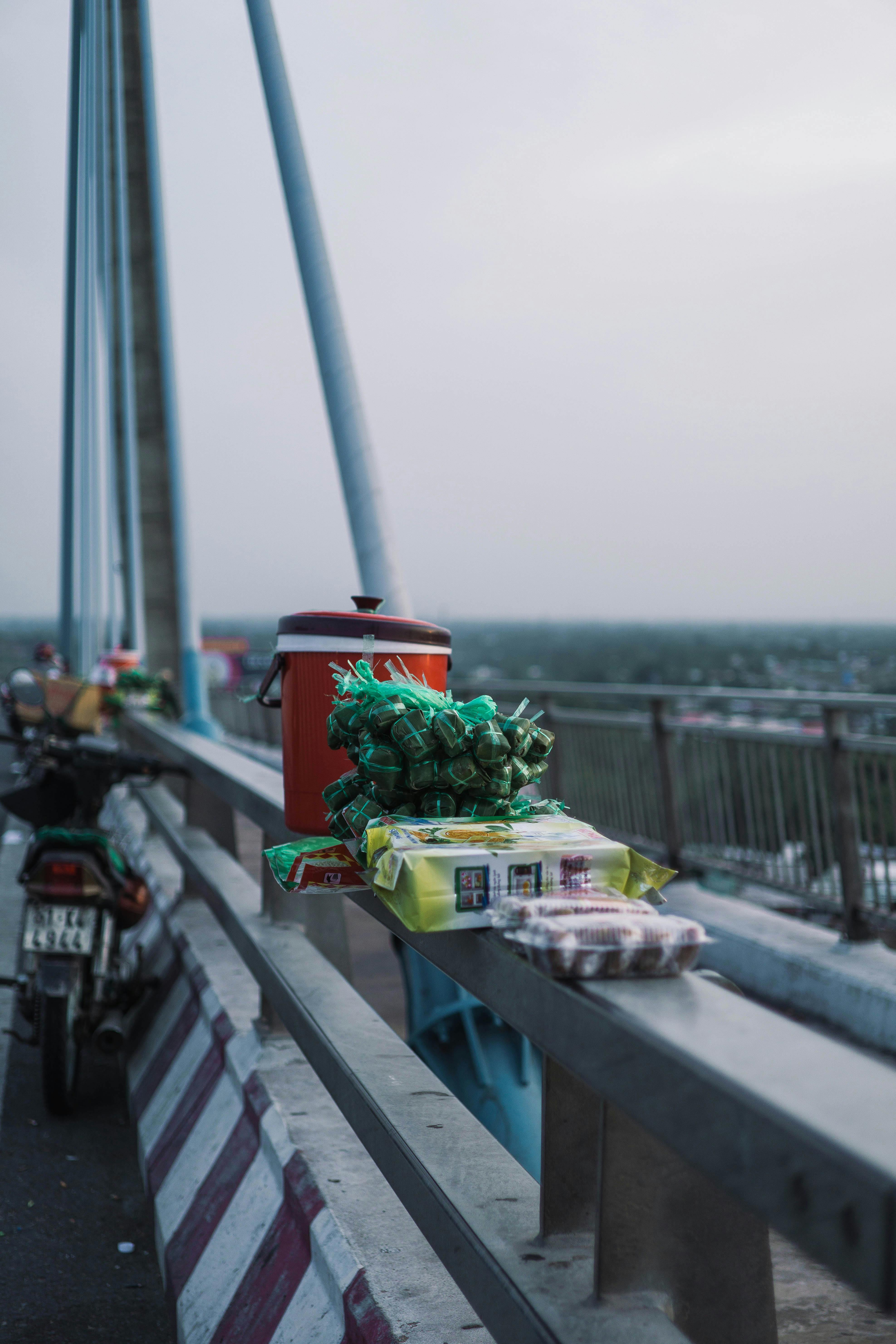 Street Vendor Stall on Urban Bridge at Dusk · Free Stock Photo