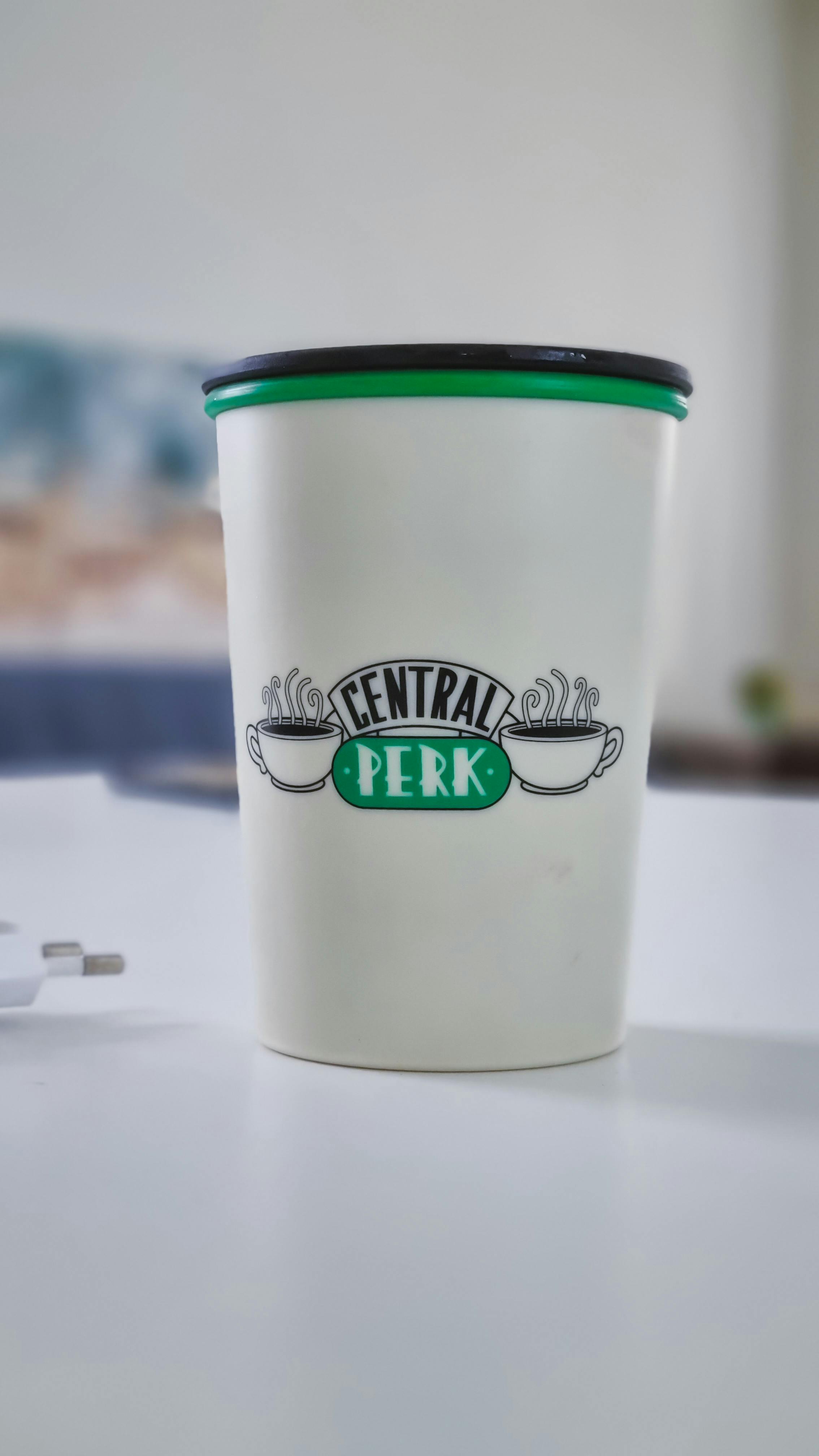 Central Perk Themed Coffee Cup on Table · Free Stock Photo