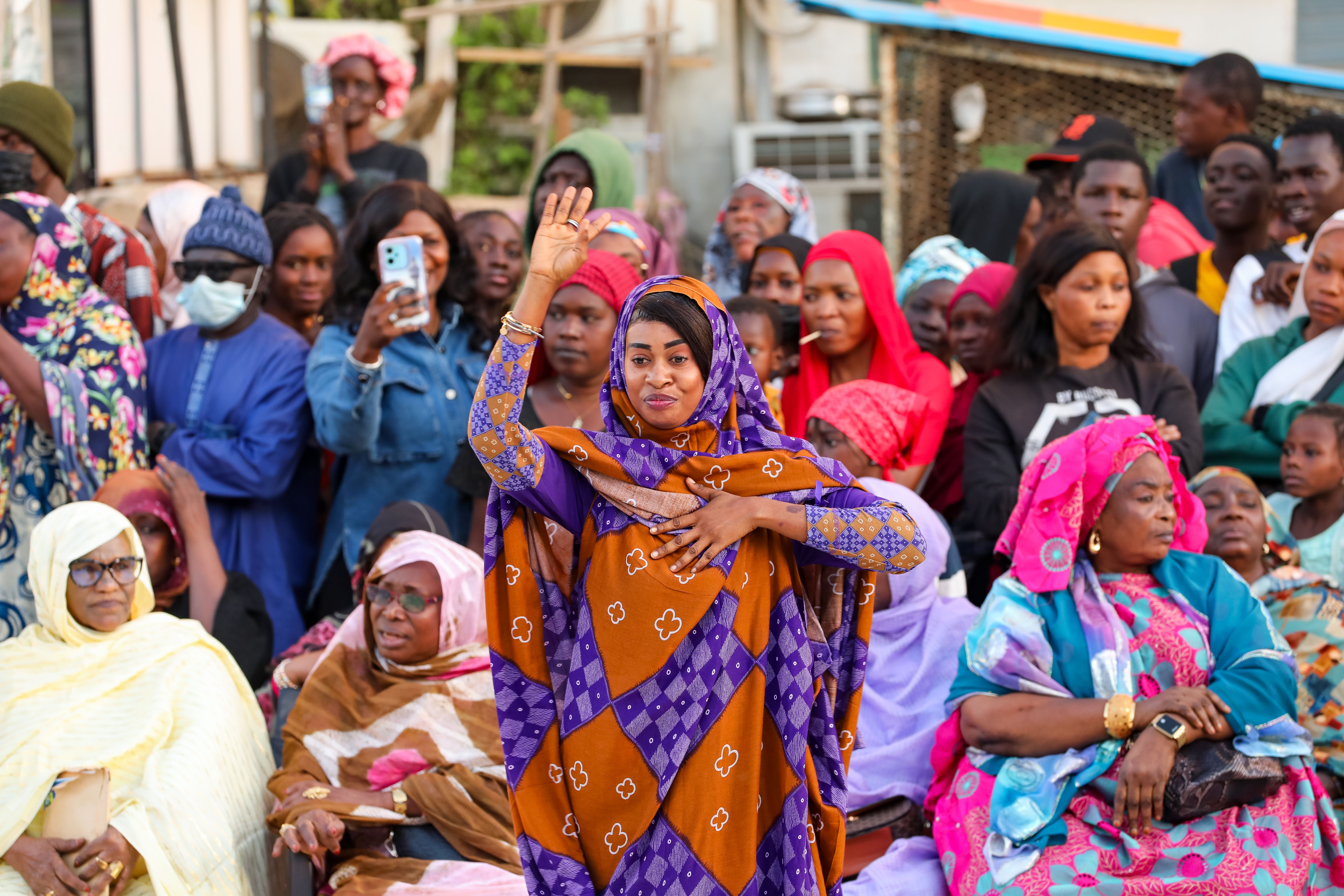 Vibrant Community Gathering with Colorful Attire · Free Stock Photo
