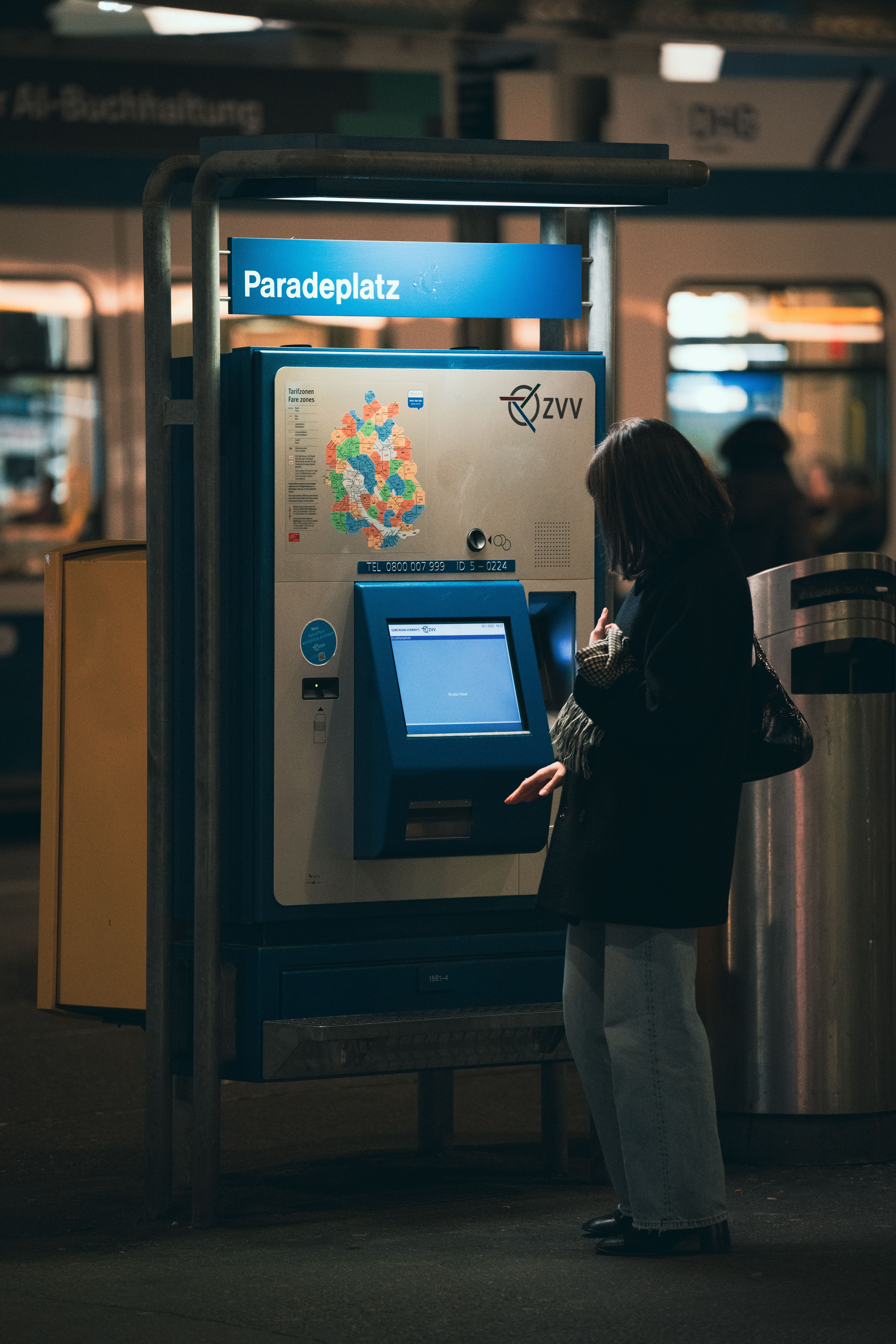 Woman Using Ticket Machine at Paradeplatz Station · Free Stock Photo