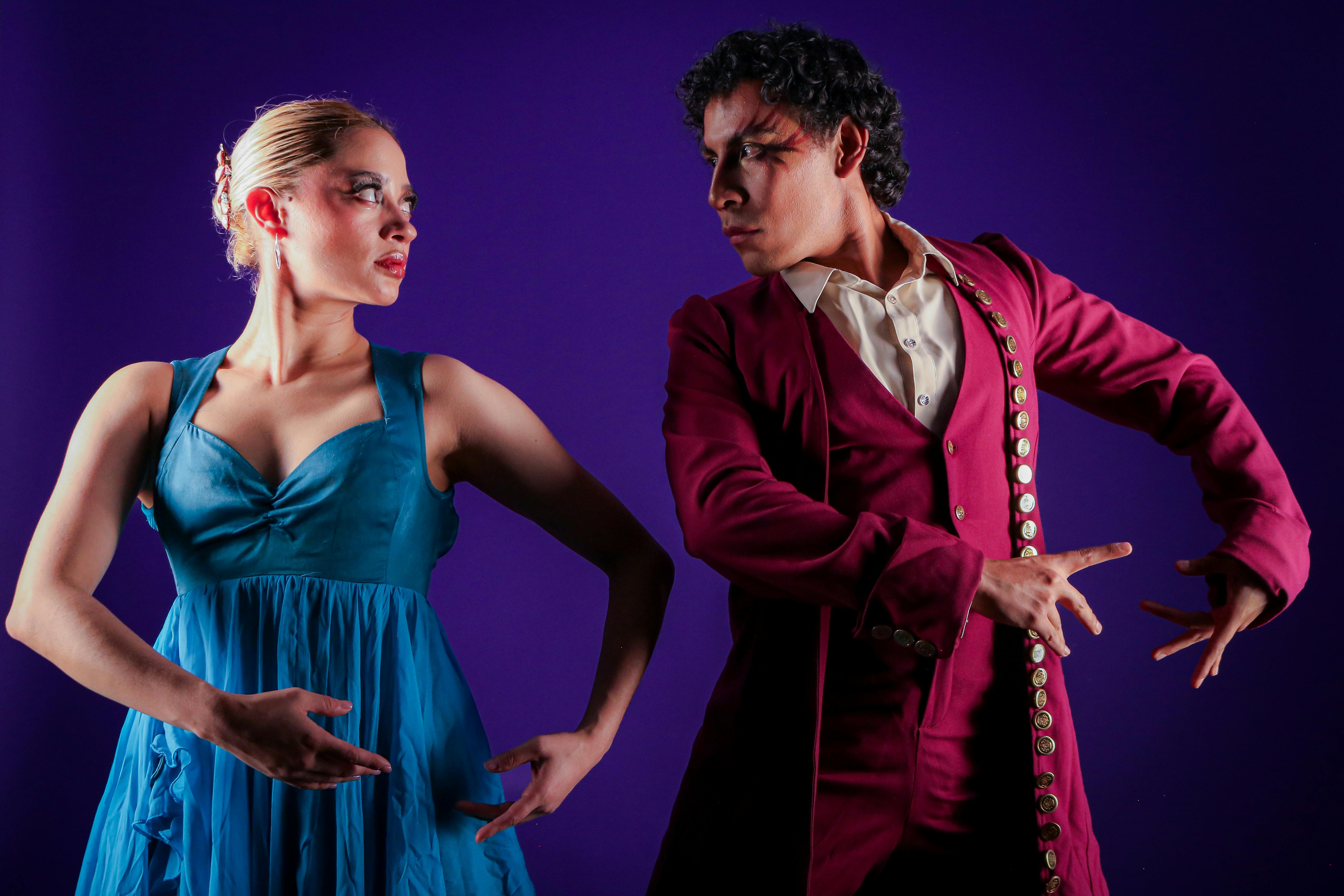 Elegant Dance Duo in Colorful Costume Performance · Free Stock Photo