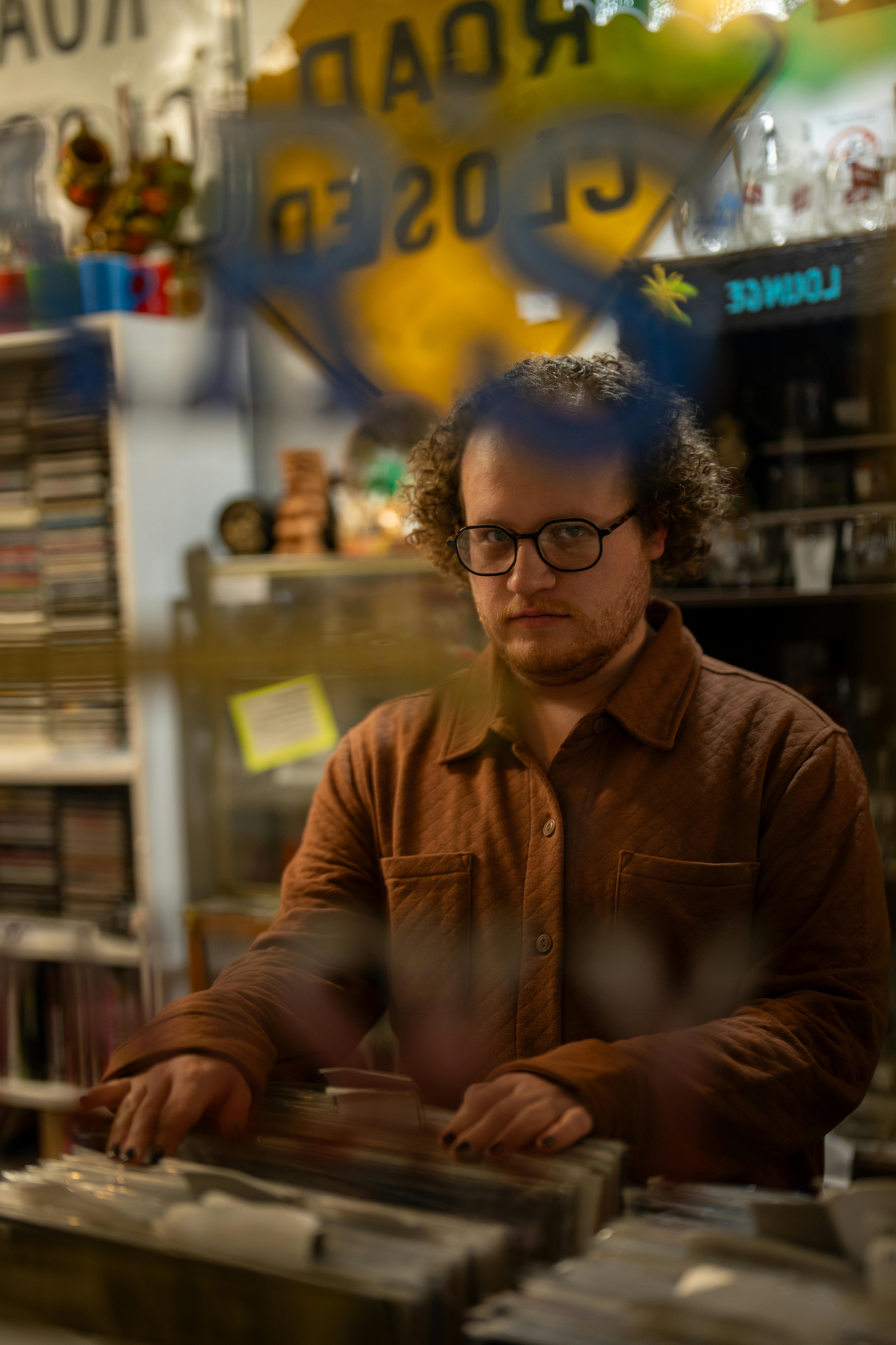 Artistic Portrait in a Record Store · Free Stock Photo