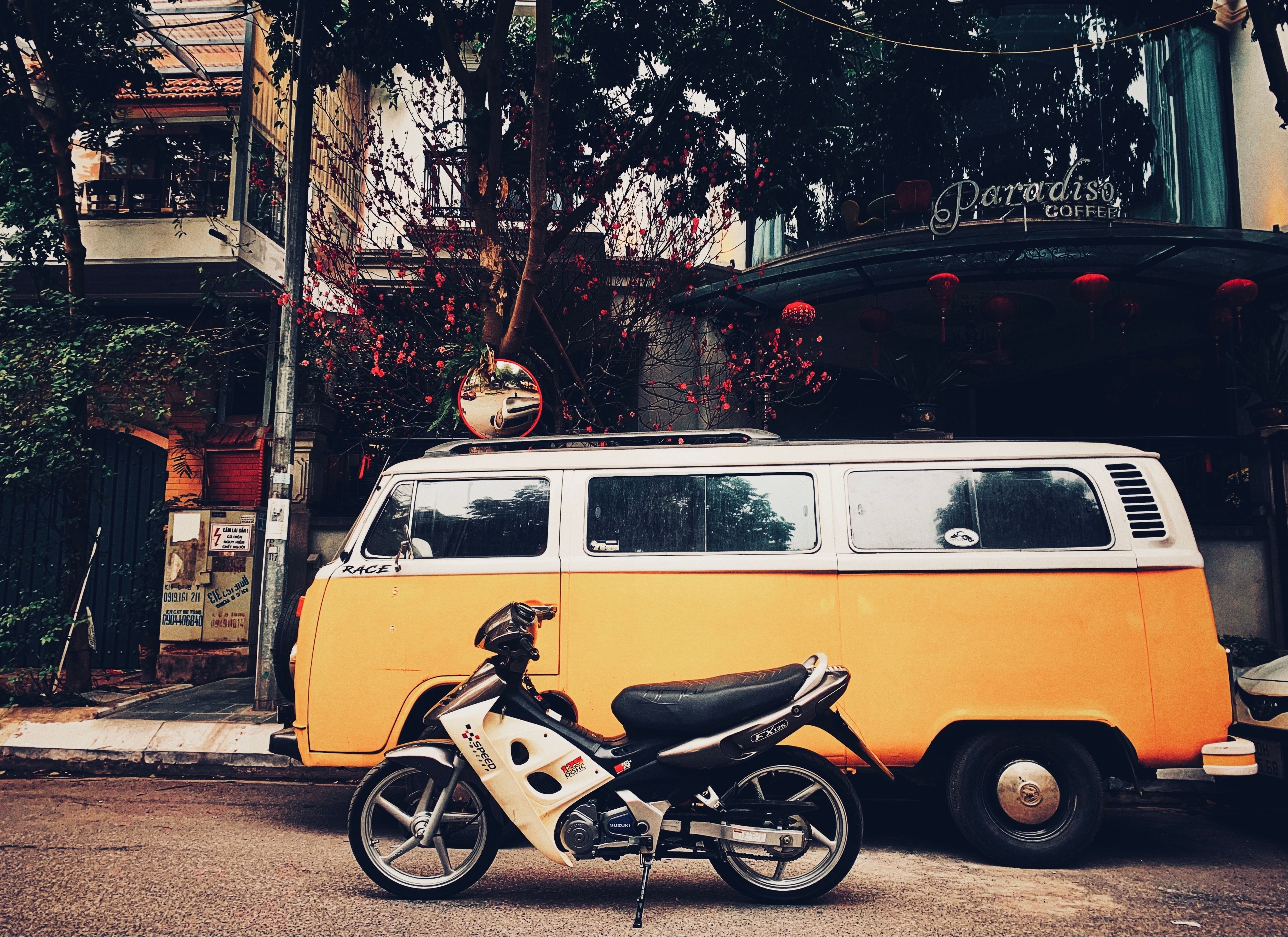 Vintage Van and Motorcycle on Urban Street · Free Stock Photo