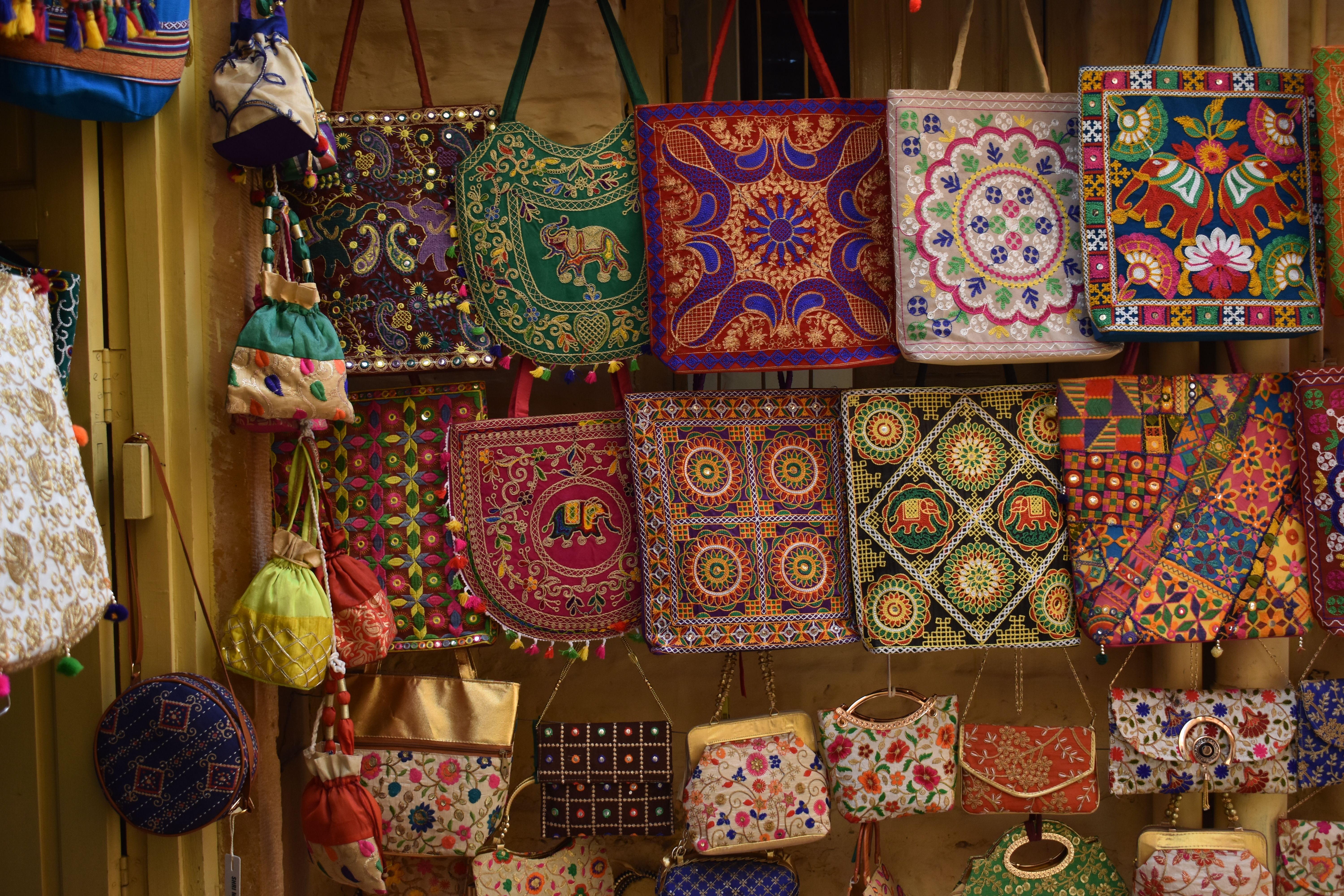 Colorful Embroidered Handbags on Display · Free Stock Photo