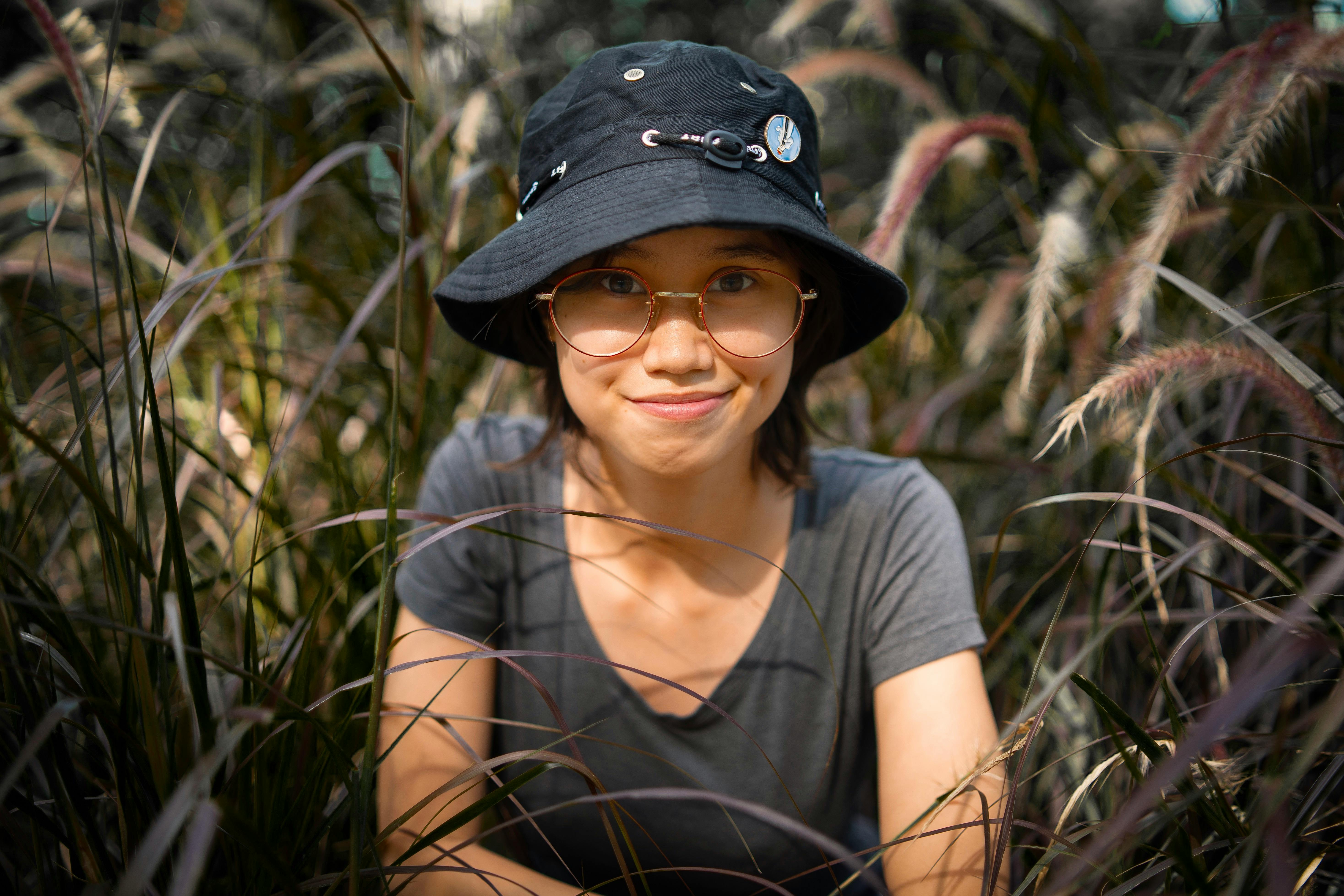 Woman With Black Bucket Cap · Free Stock Photo
