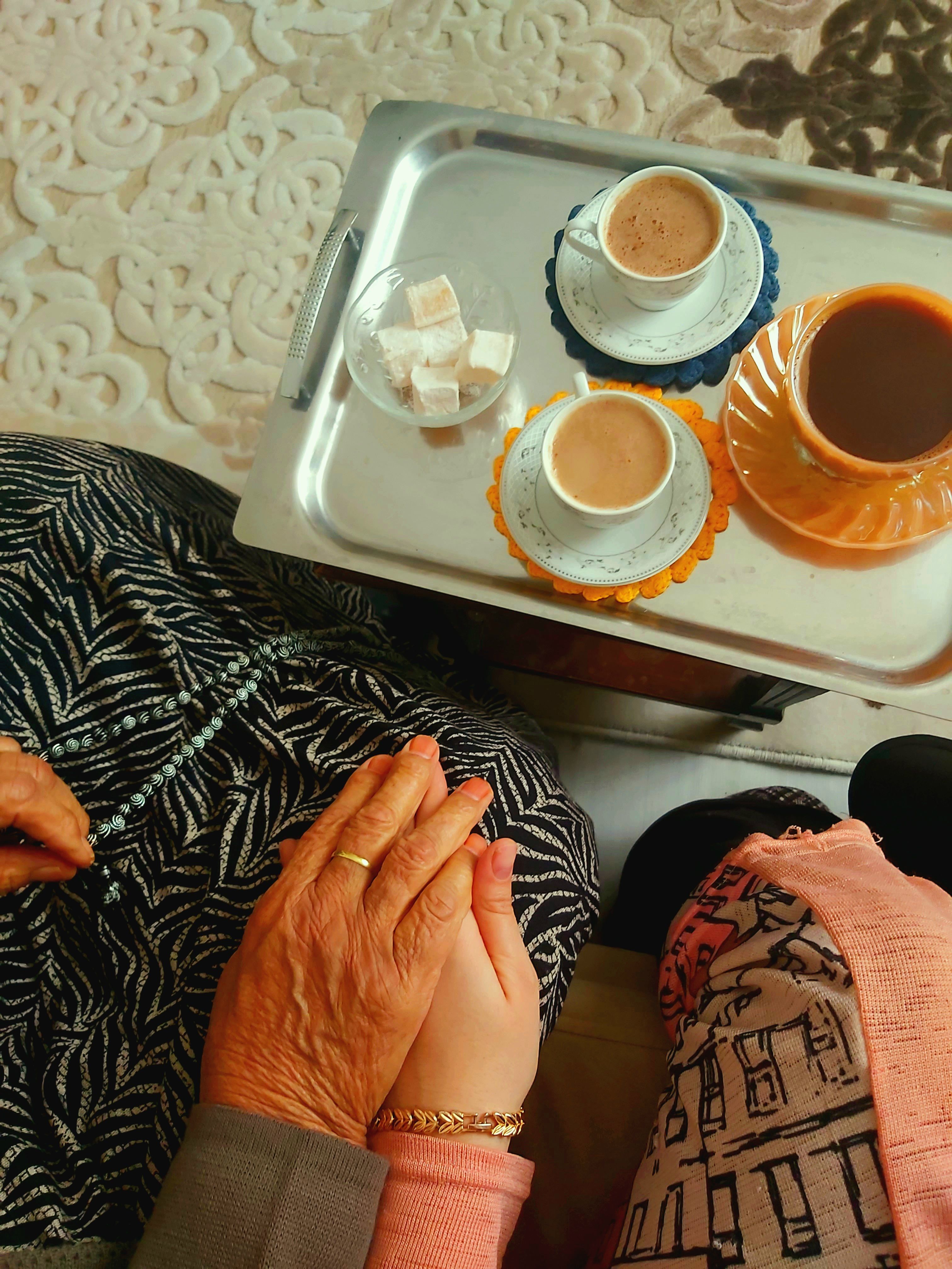 Intergenerational Bond Over Coffee and Treats · Free Stock Photo