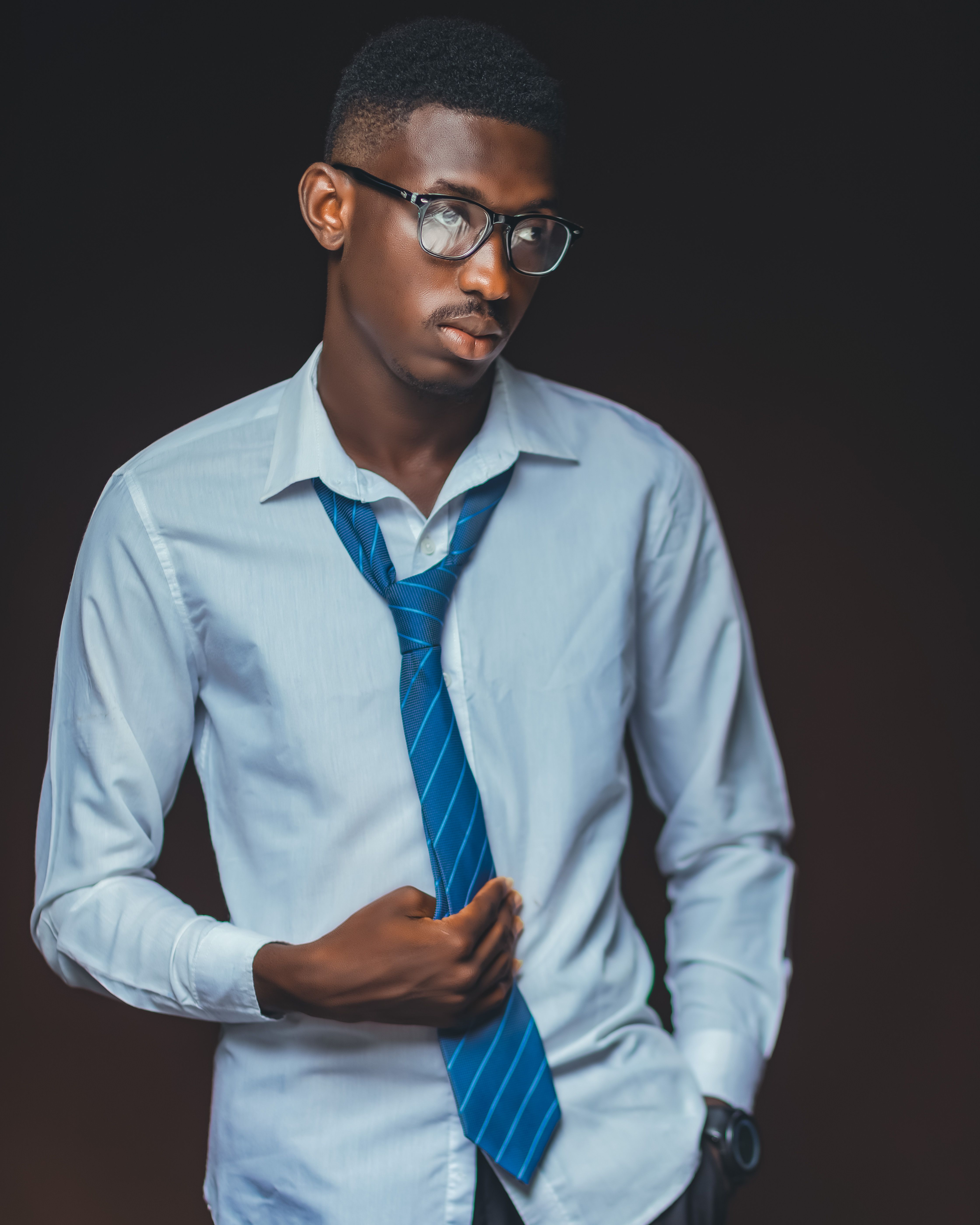 Stylish Young Man in Blue Tie Portrait · Free Stock Photo