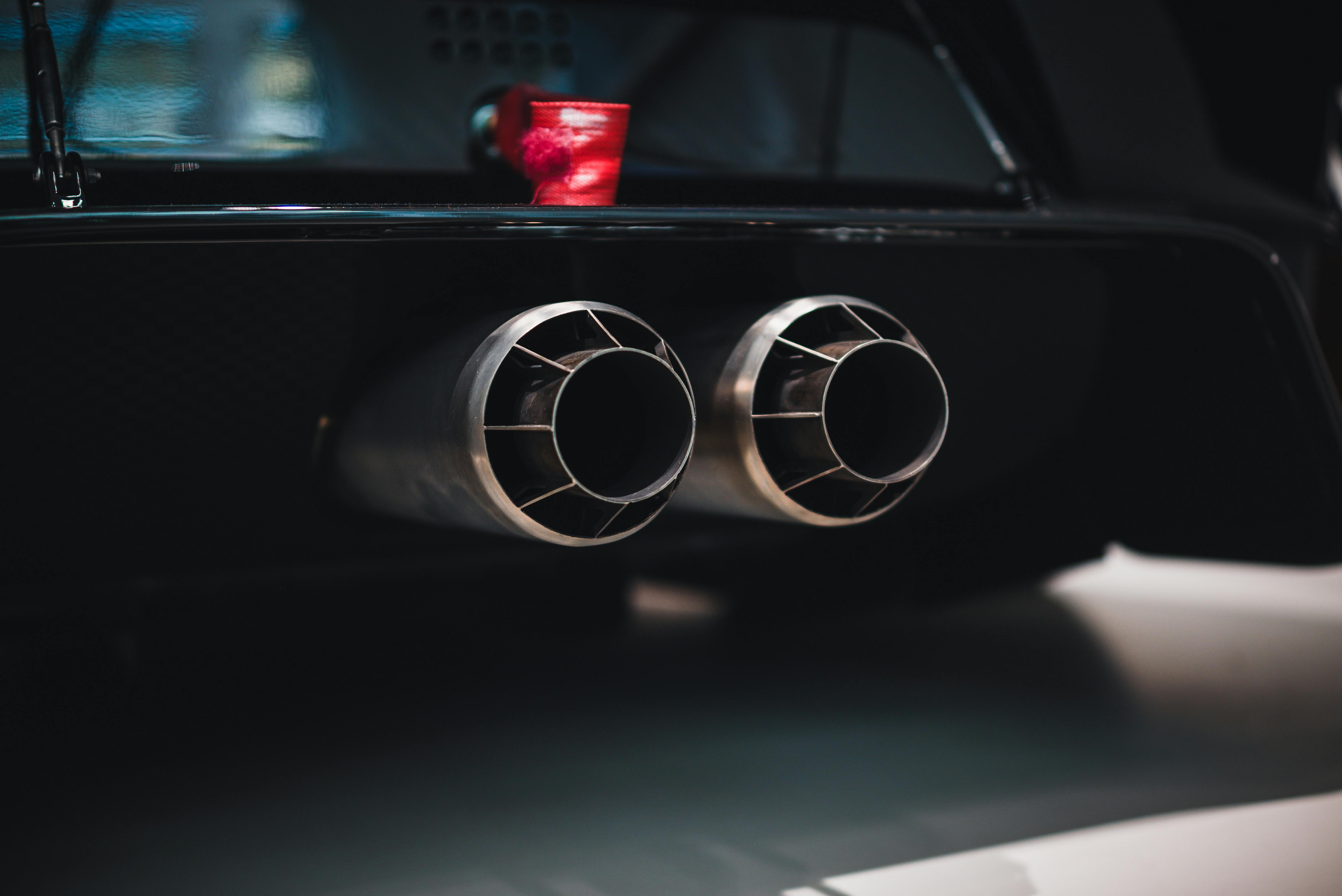 Close-up of Dual Exhaust Pipes on a Car · Free Stock Photo
