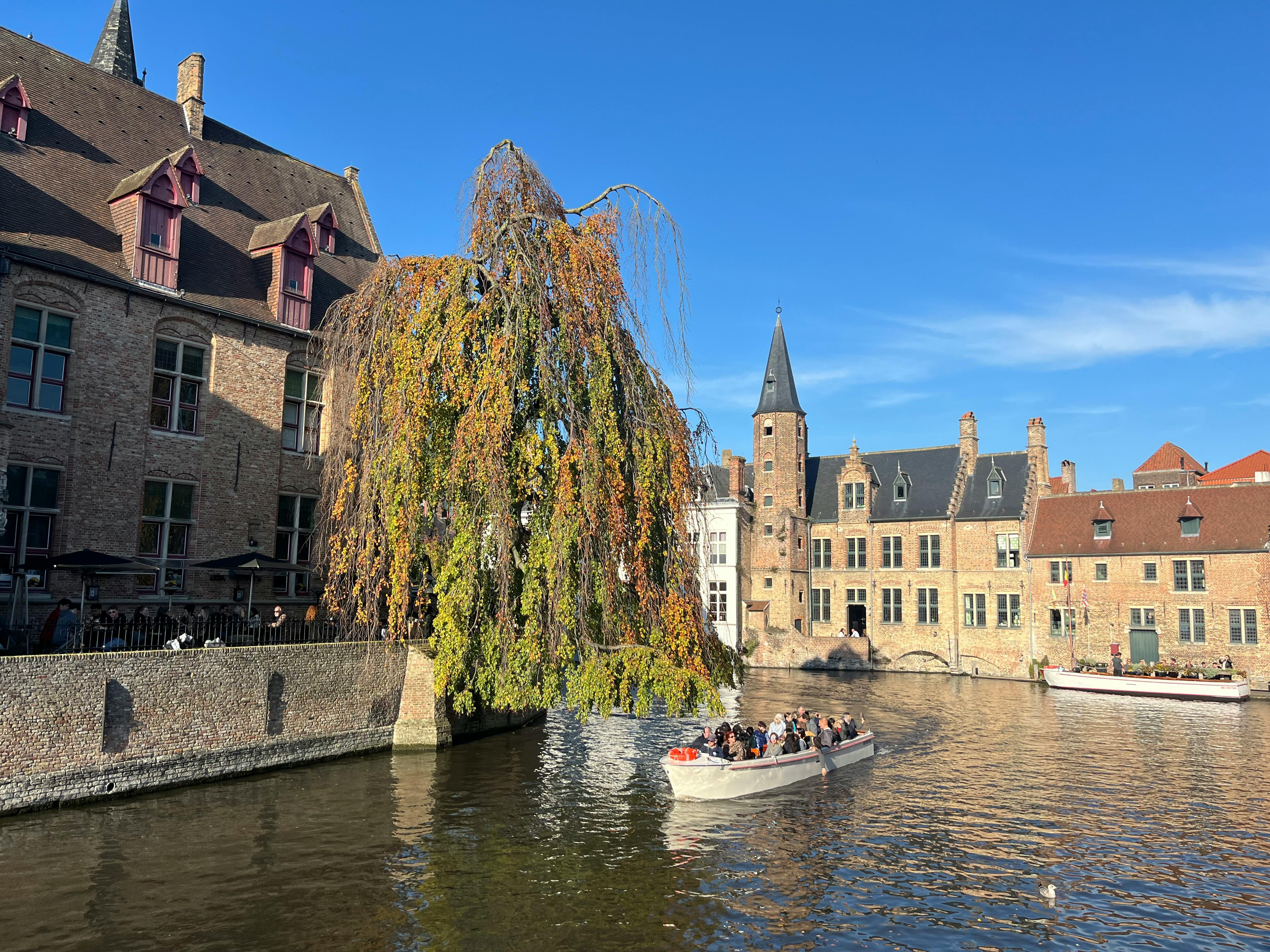 Historic Canal with Boat in Bruges, Belgium · Free Stock Photo