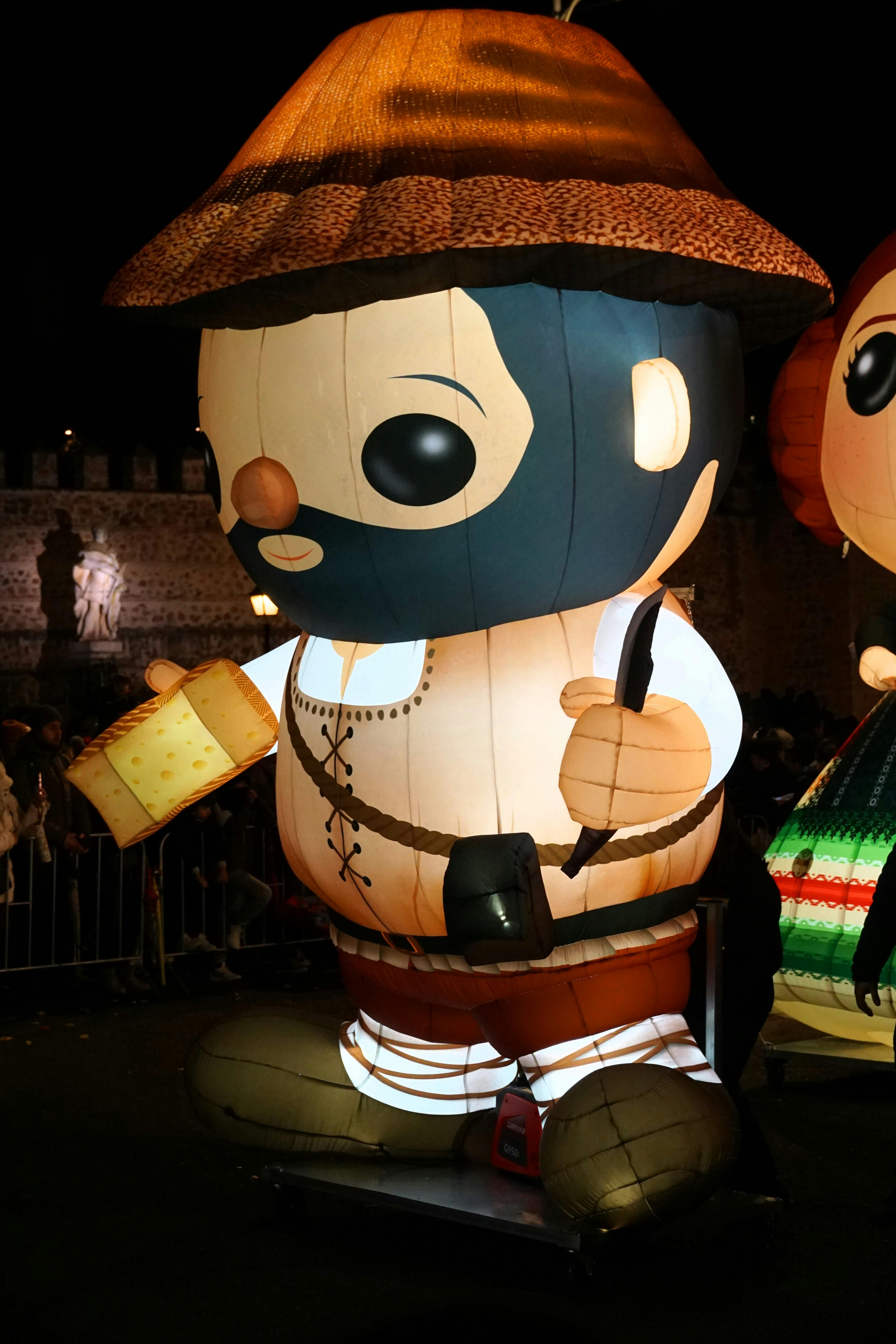 Colorful Night Parade with Giant Inflatable Figures · Free Stock Photo