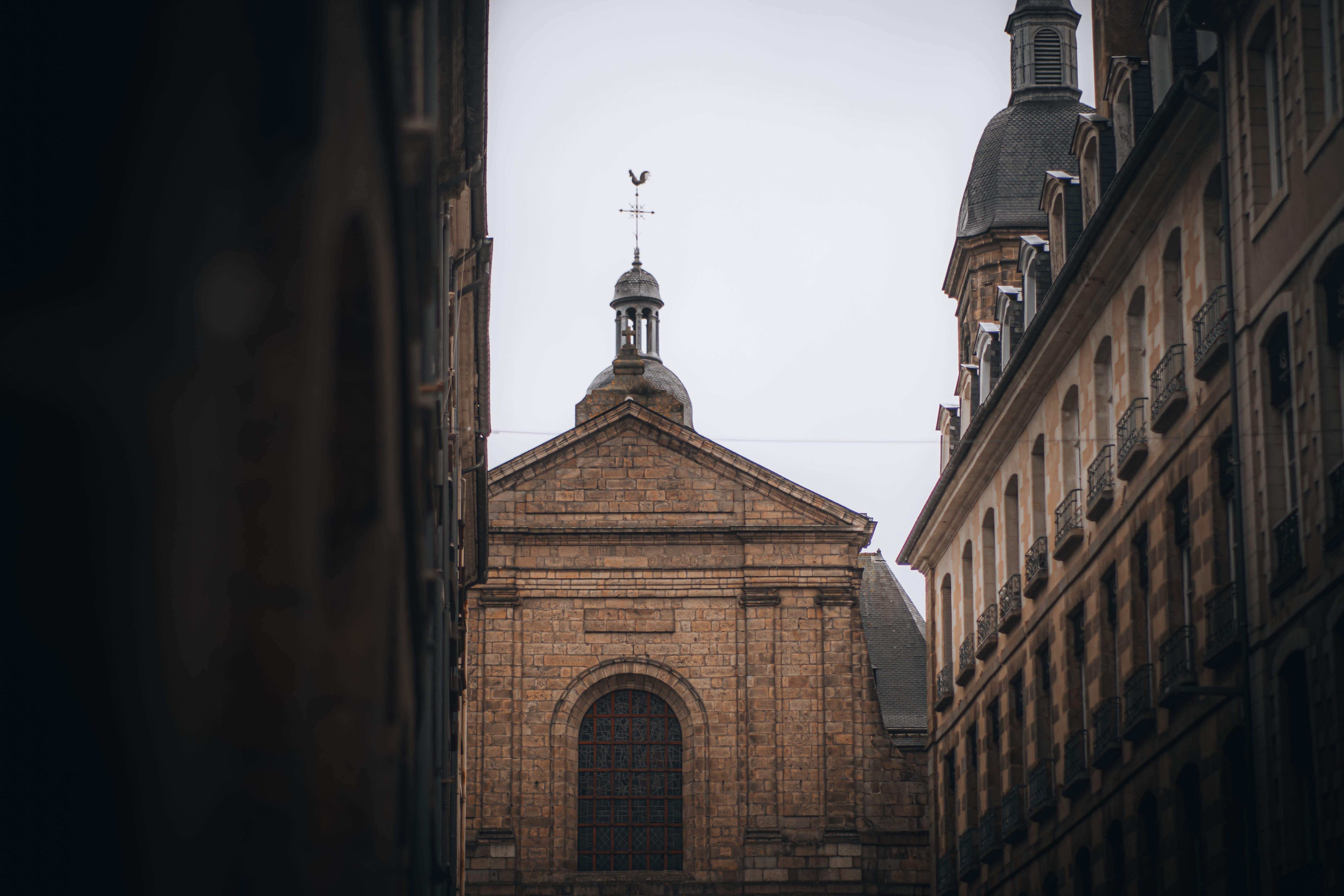 Historical European Architecture in Moody Alleyway · Free Stock Photo