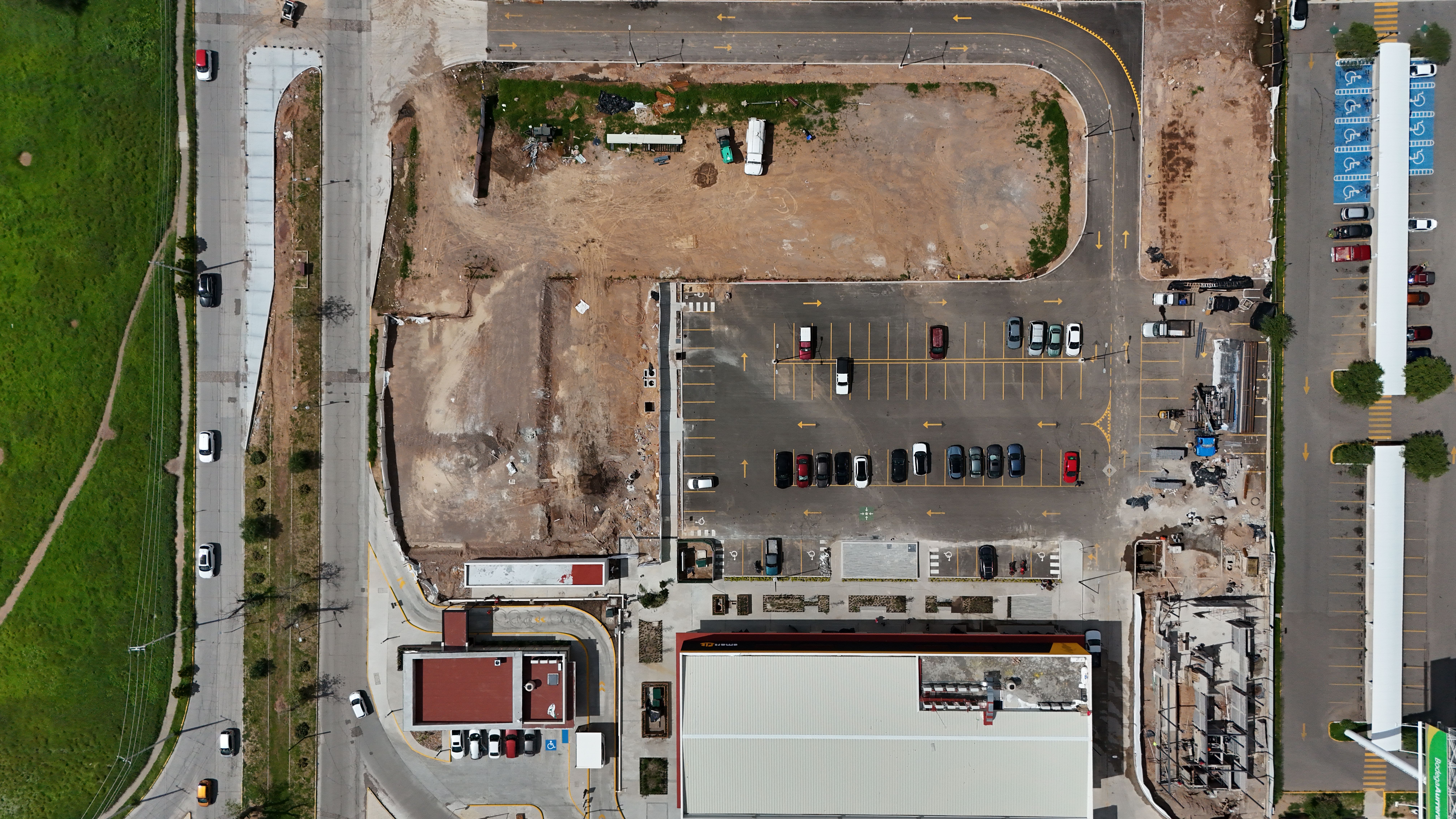 Aerial View of Parking Lot and Construction Site · Free Stock Photo