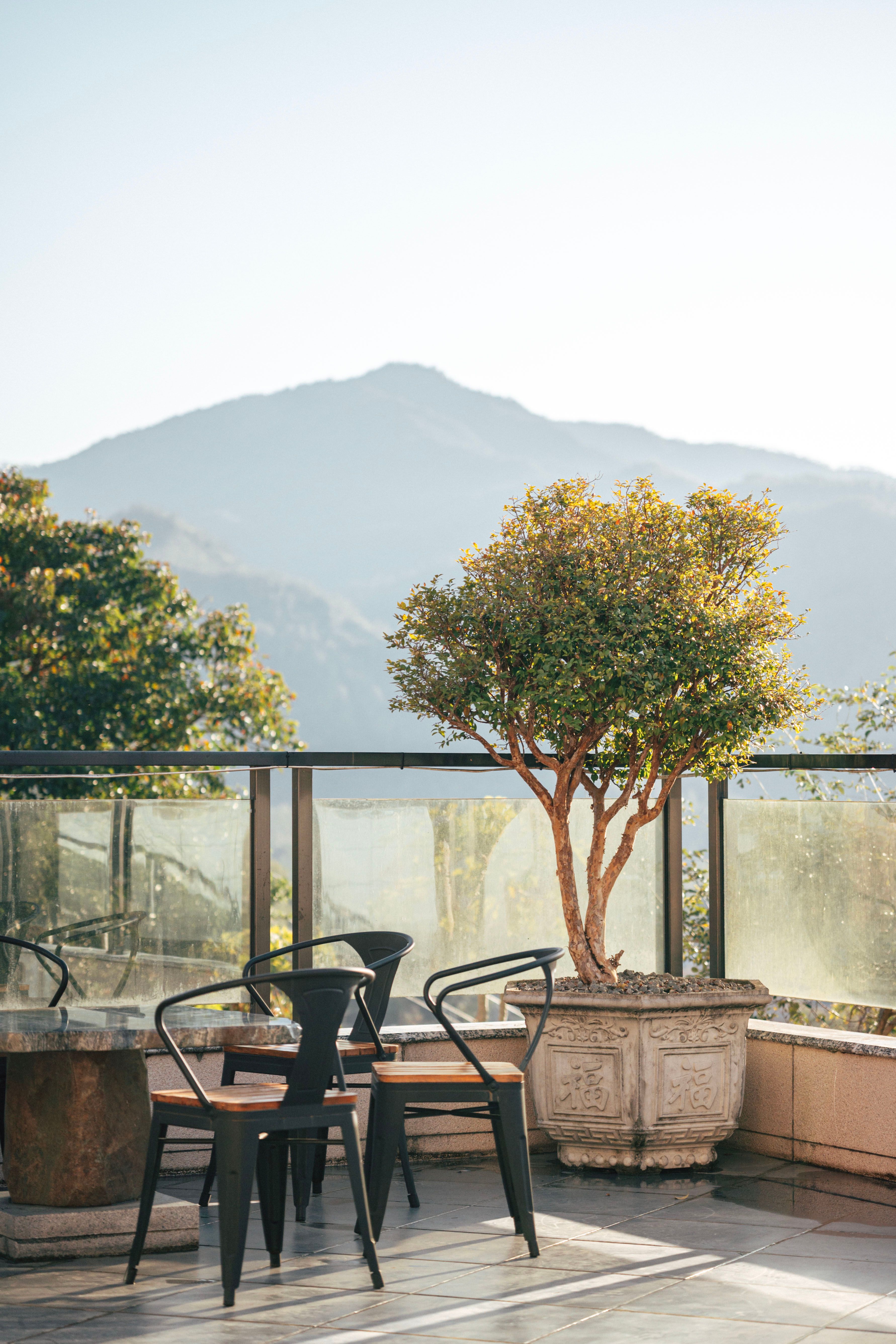 Tranquil Outdoor Terrace with Mountain View · Free Stock Photo