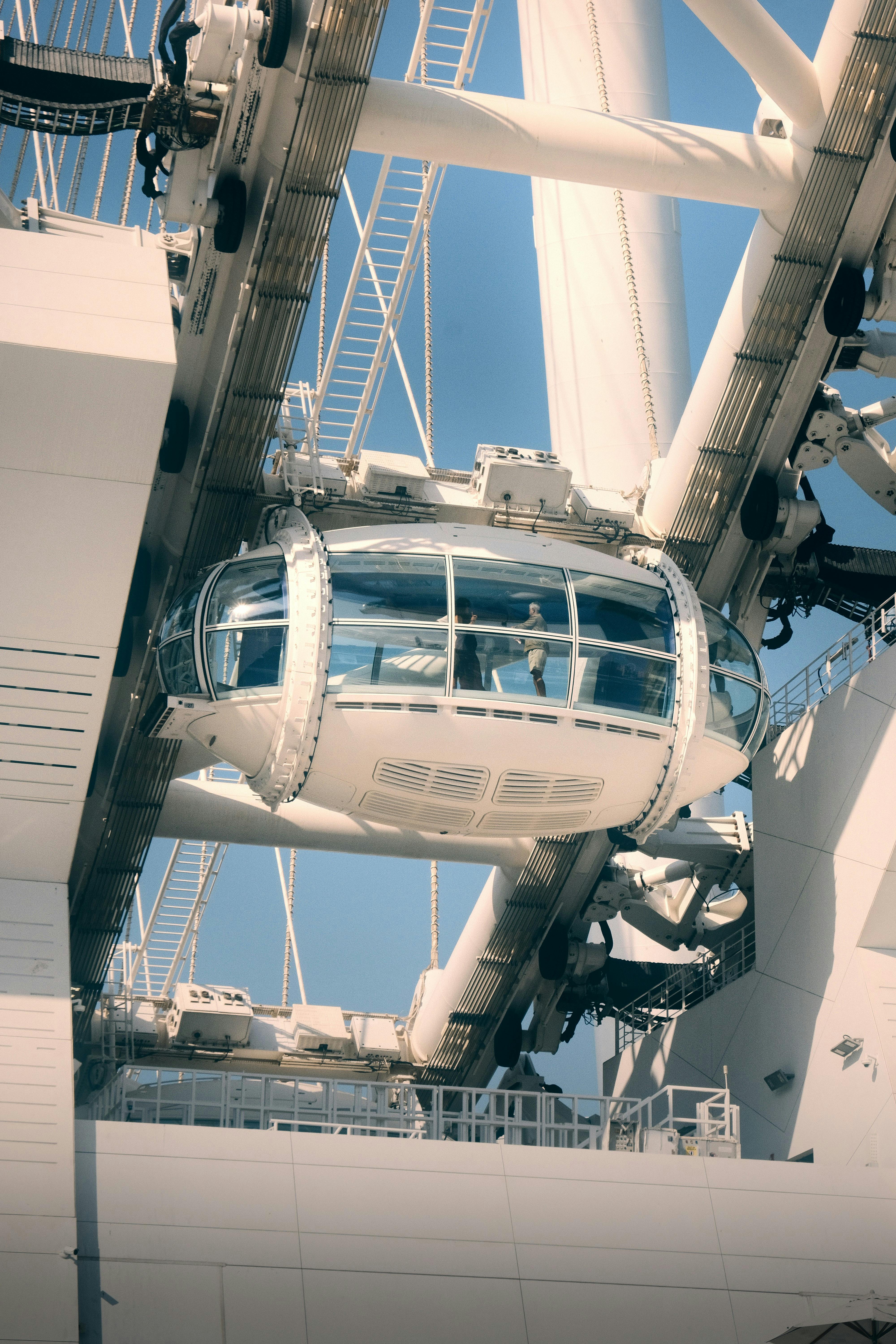 Close-Up of Ferris Wheel Cabin in Urban Setting · Free Stock Photo