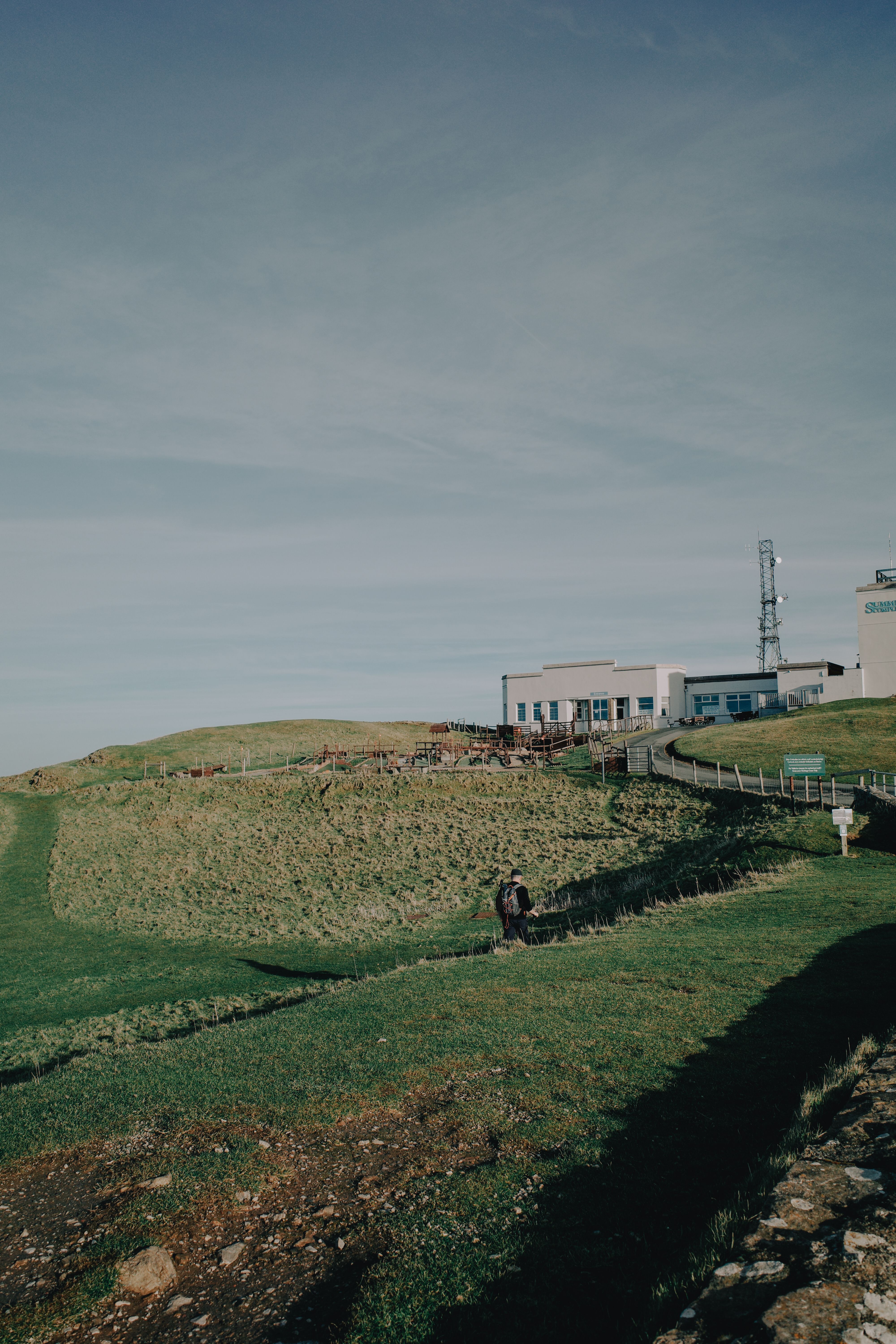 Scenic View of Wales Countryside with Modern Building · Free Stock Photo