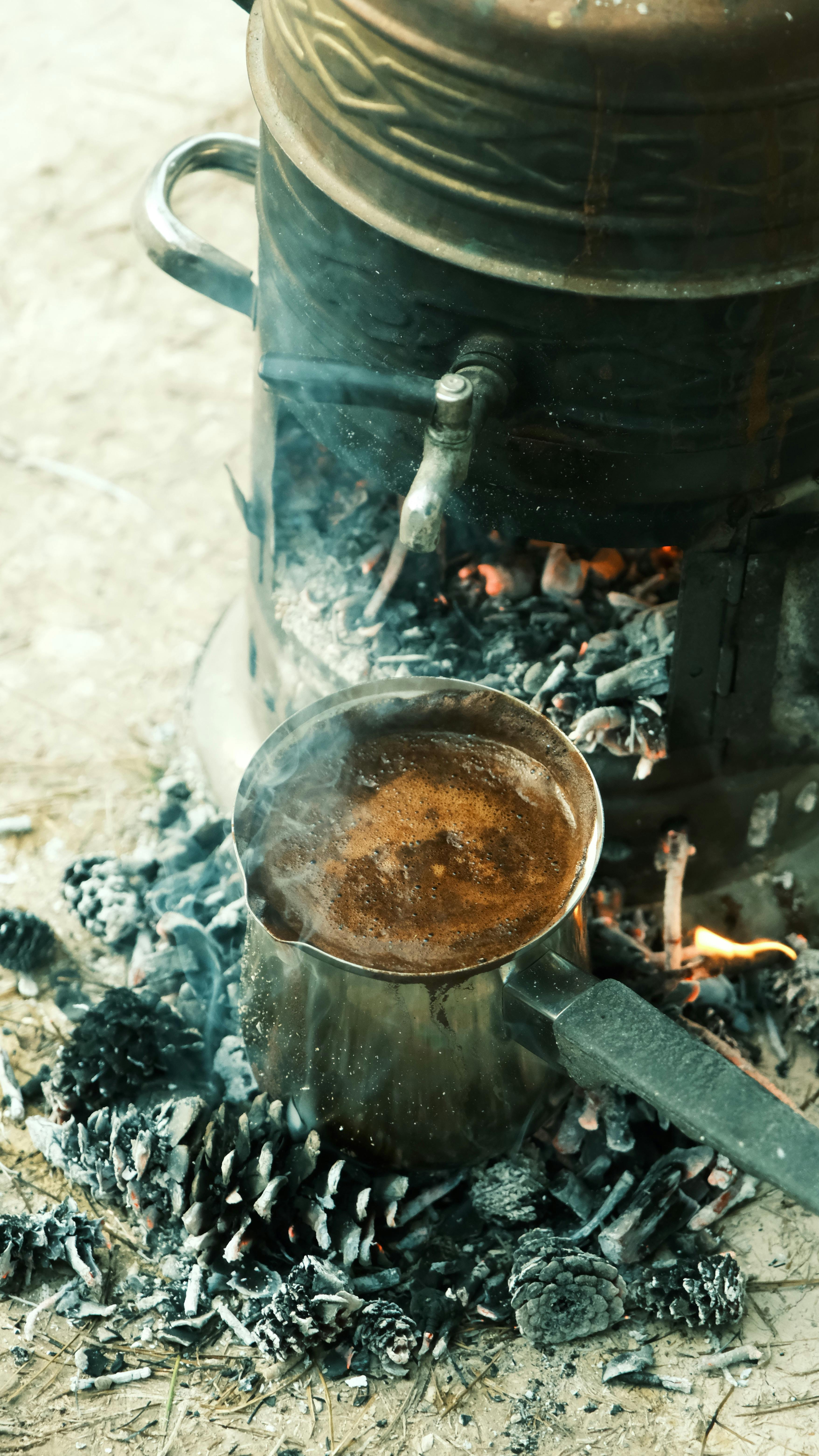 Outdoor Coffee Brewing with Rustic Kettle · Free Stock Photo