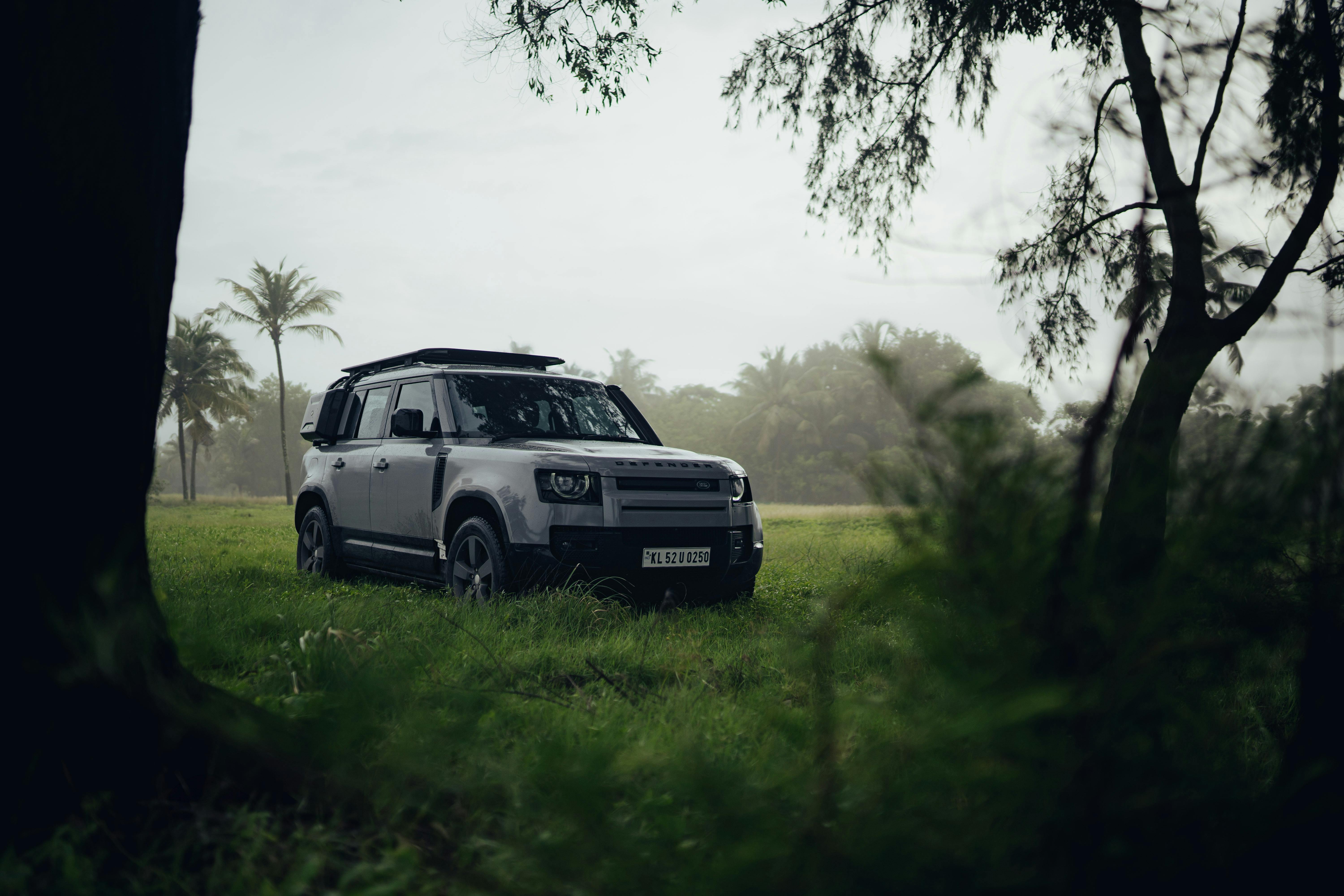 Off-Road Vehicle in Lush Kerala Landscape · Free Stock Photo
