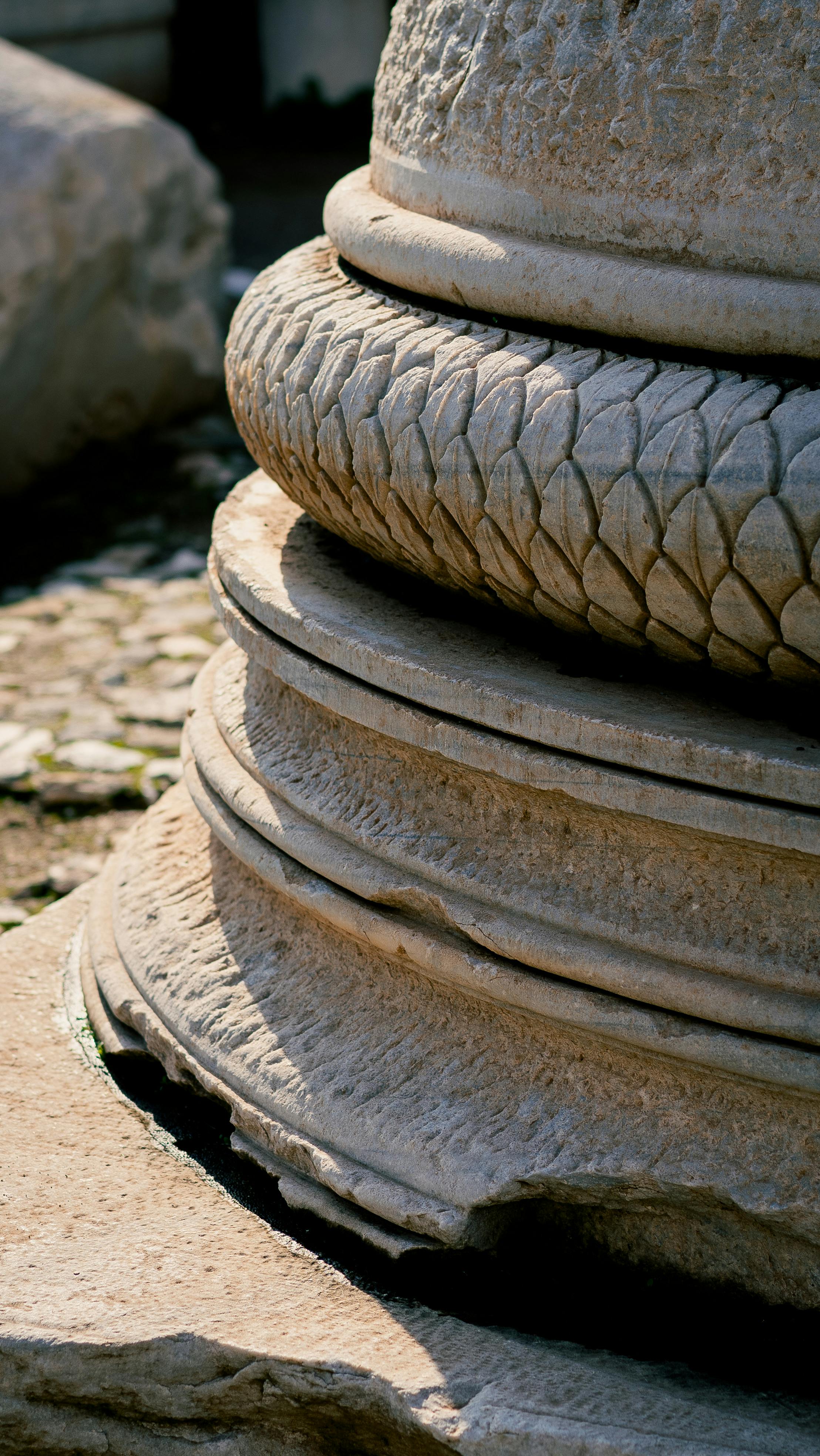Detailed Close-up of Ancient Stone Column · Free Stock Photo
