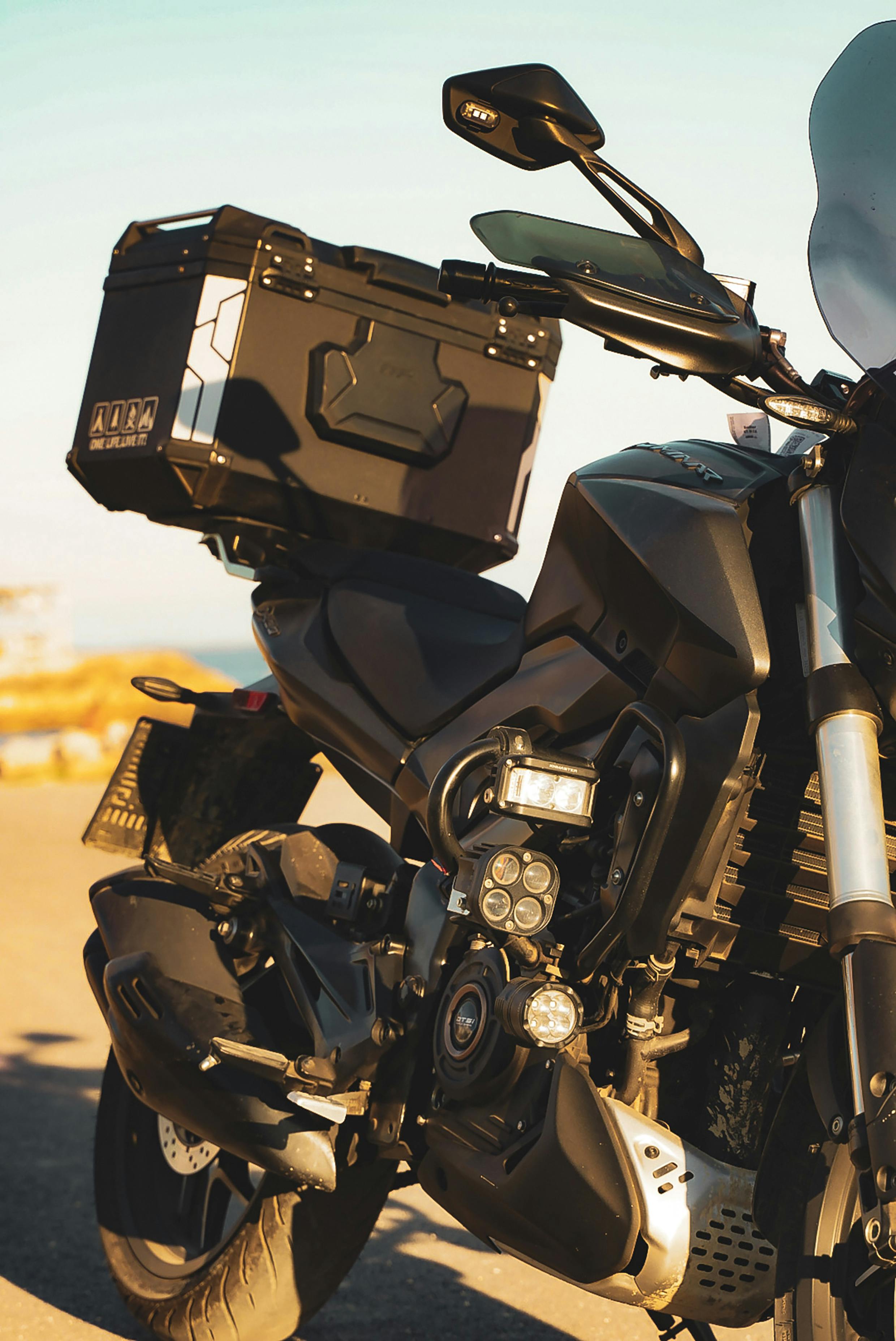 Adventure Motorcycle with Cargo Box at Sunset · Free Stock Photo