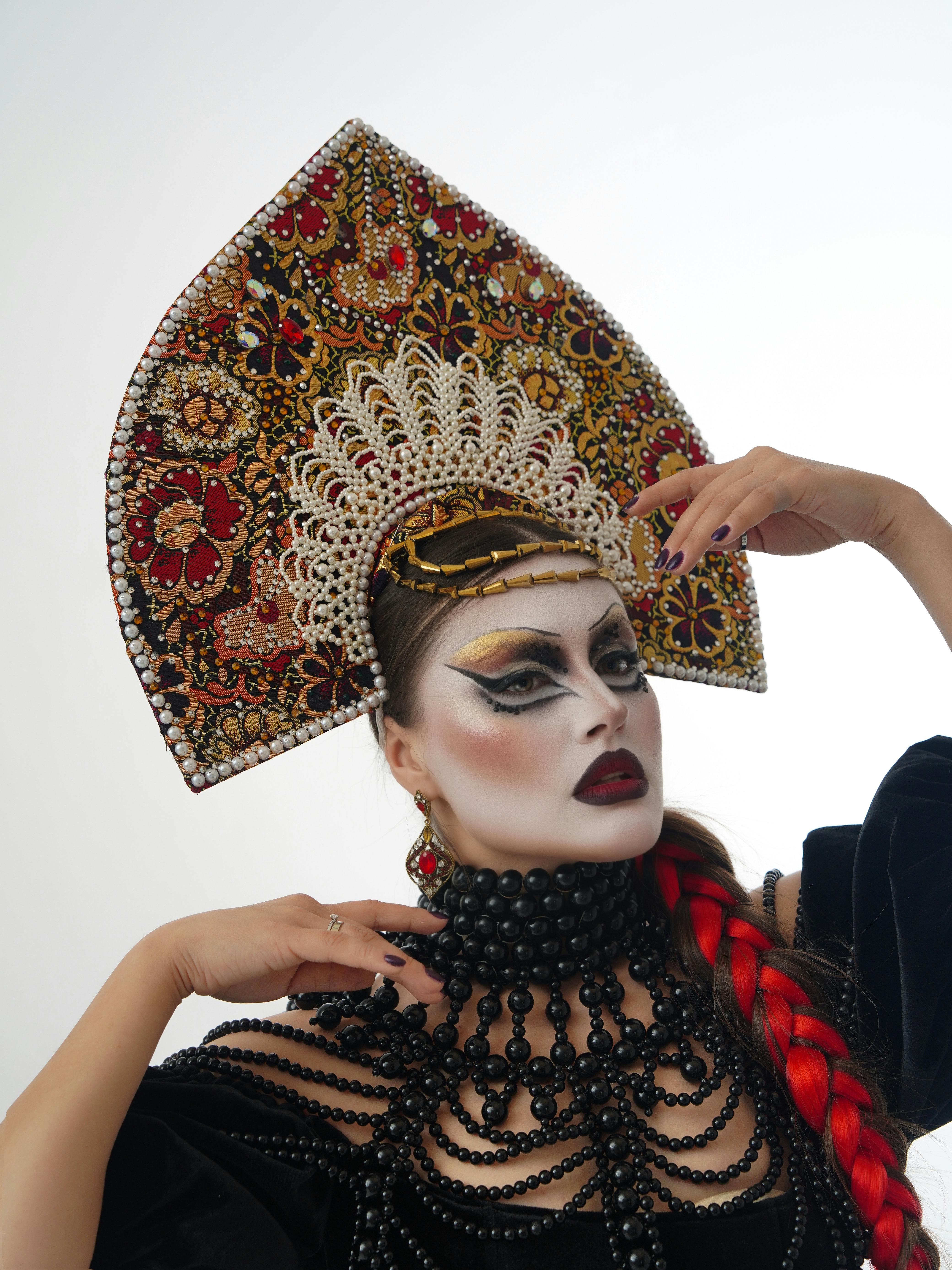 Exquisite Traditional Headpiece and Artistic Makeup · Free Stock Photo