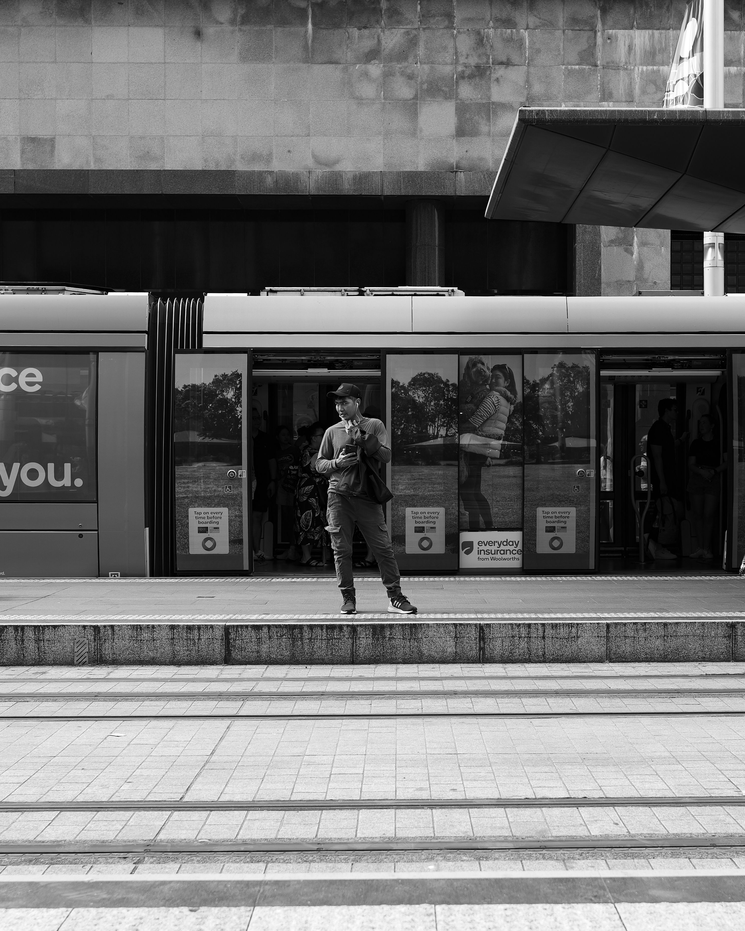 Urban Commuter Waiting at Sydney Tram Station · Free Stock Photo