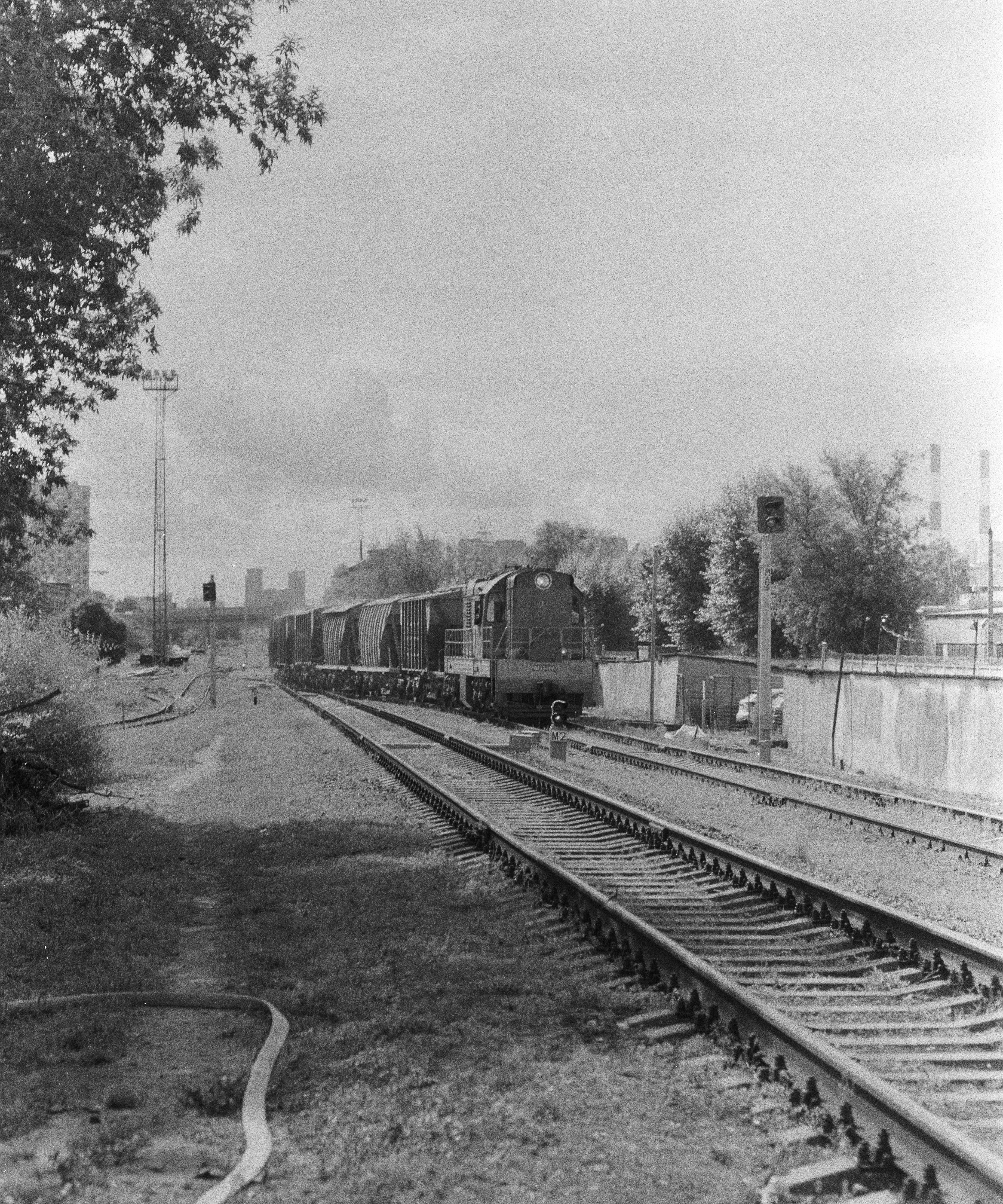 Vintage Black and White Freight Train Scene · Free Stock Photo