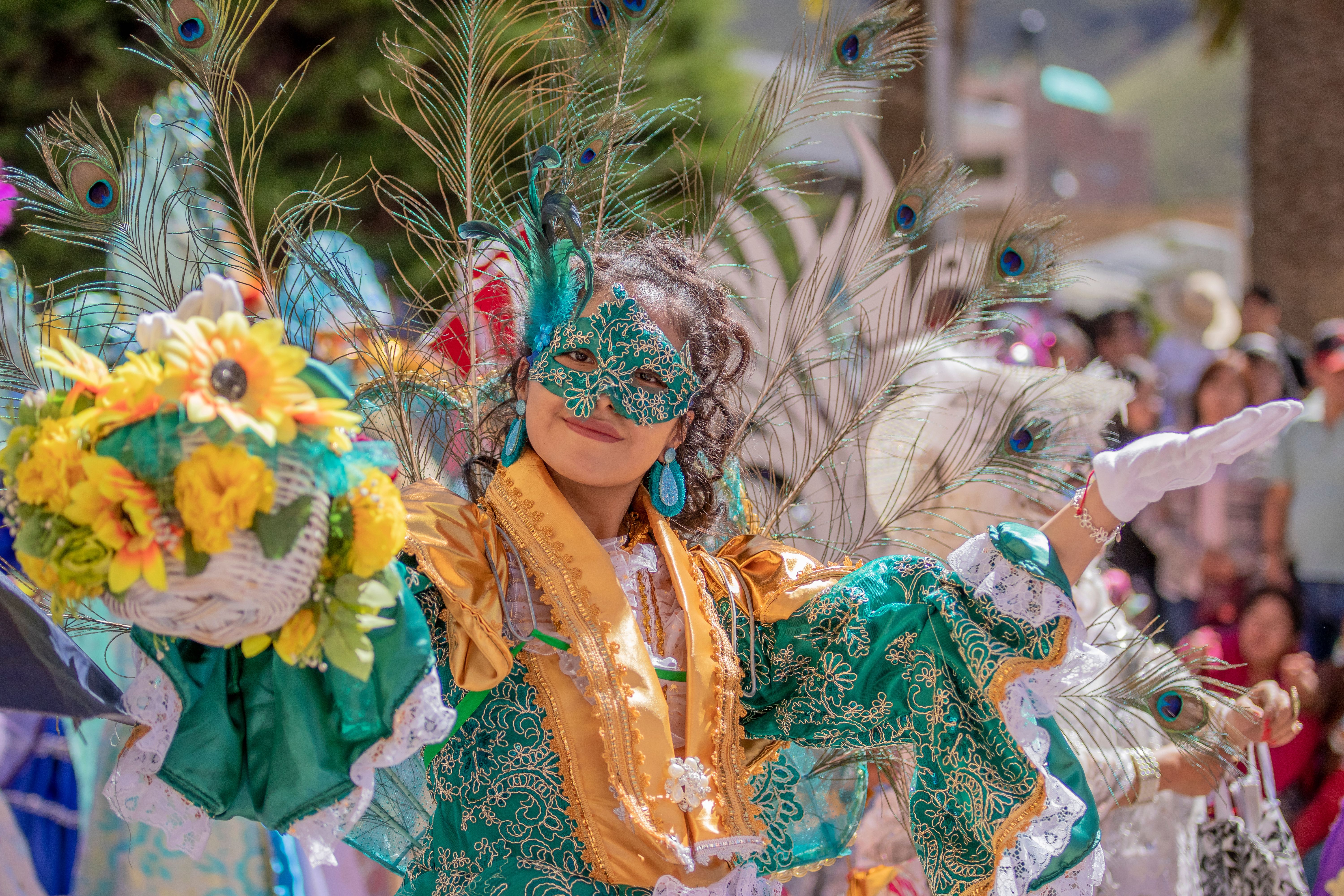 Colorful Carnival Costume with Peacock Feathers · Free Stock Photo
