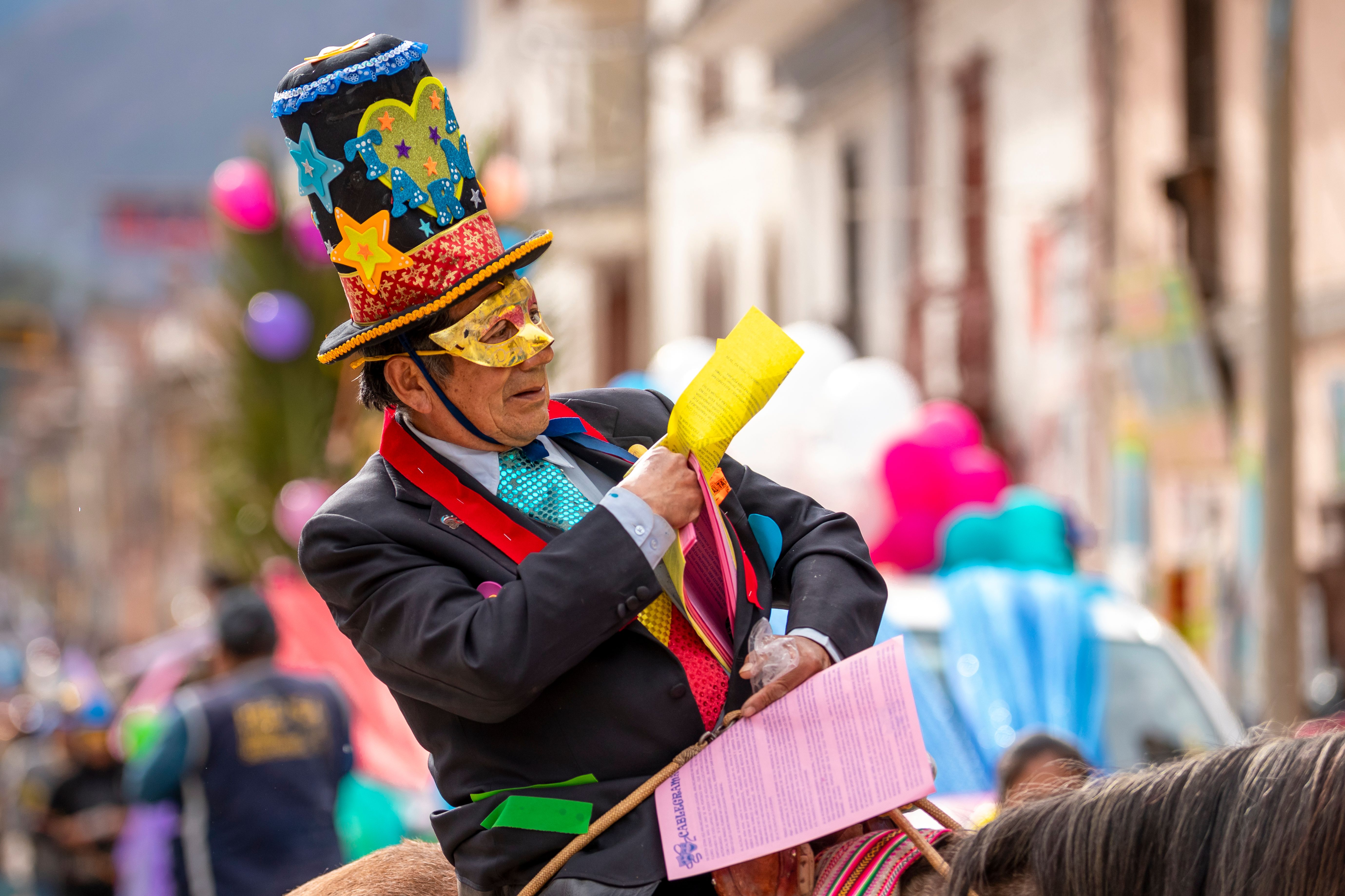 Festive Costume Parade with Colorful Hat and Mask · Free Stock Photo