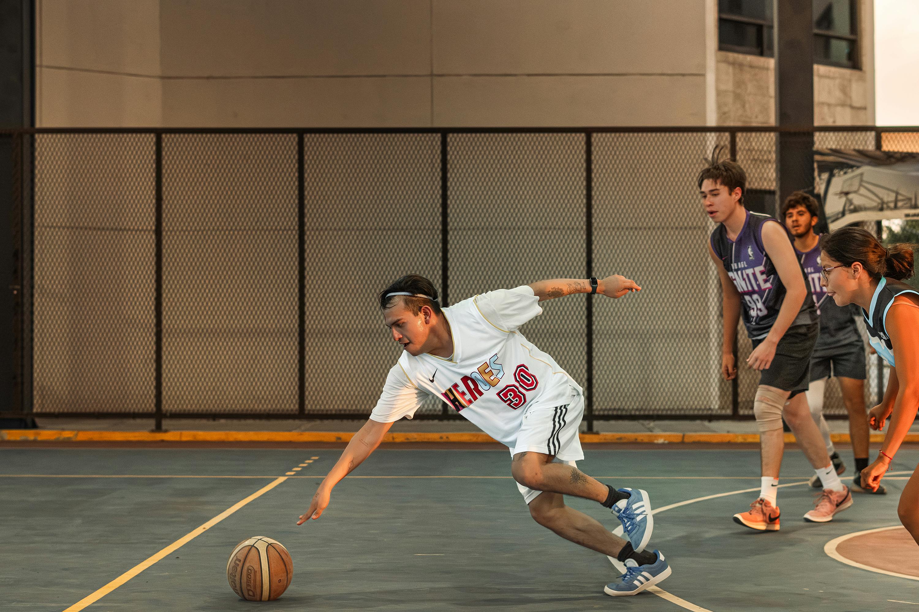 Street Basketball Game in Action on Outdoor Court · Free Stock Photo