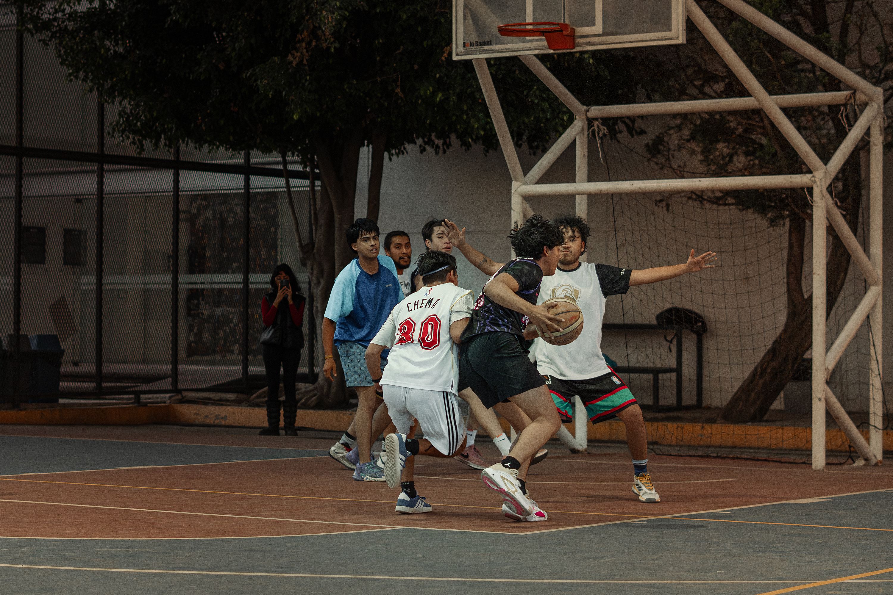 Intense Street Basketball Game in Action · Free Stock Photo
