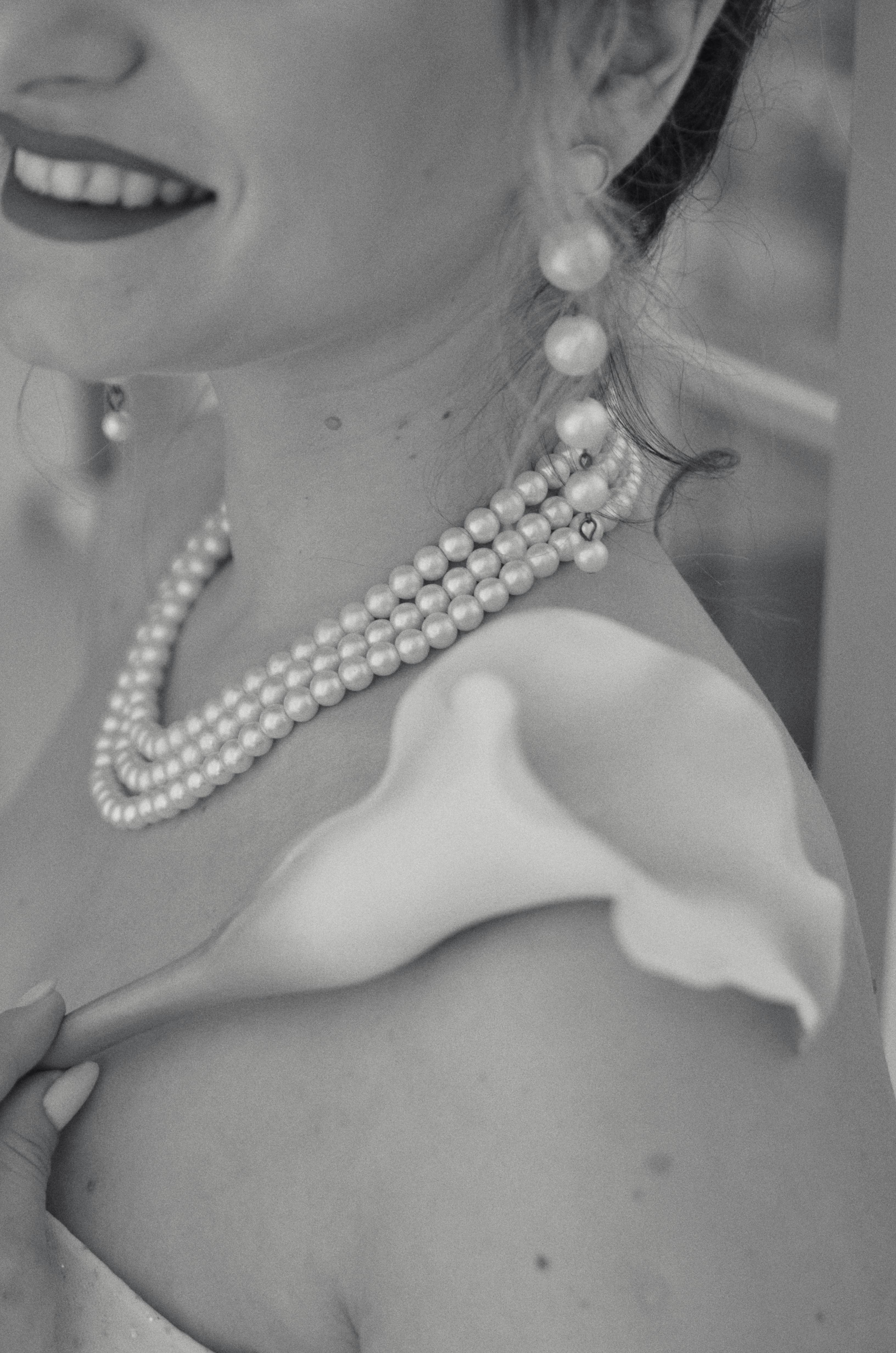 Elegant Bridal Portrait with Pearl Necklace and Lily · Free Stock Photo