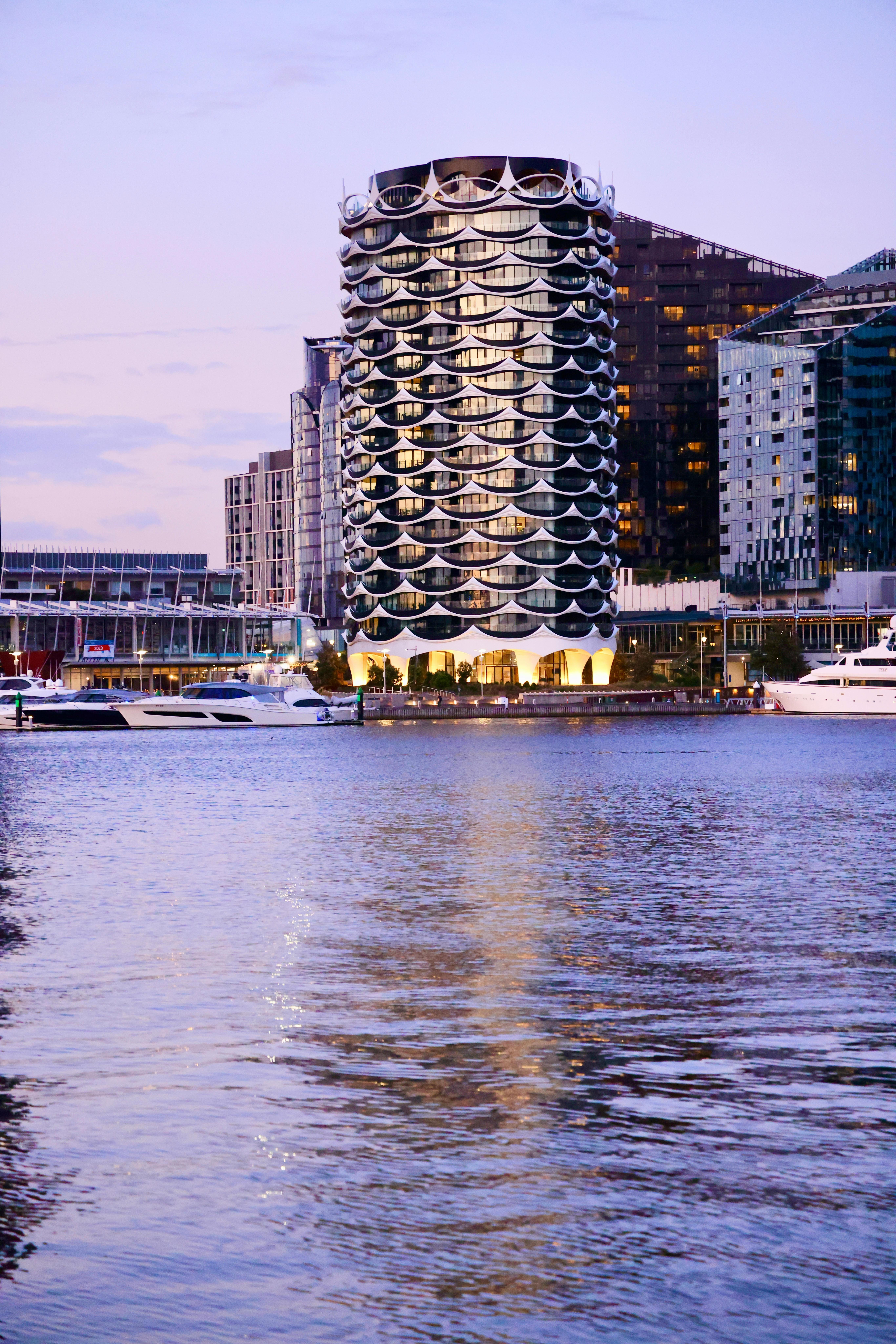 Modern waterfront architecture at dusk · Free Stock Photo