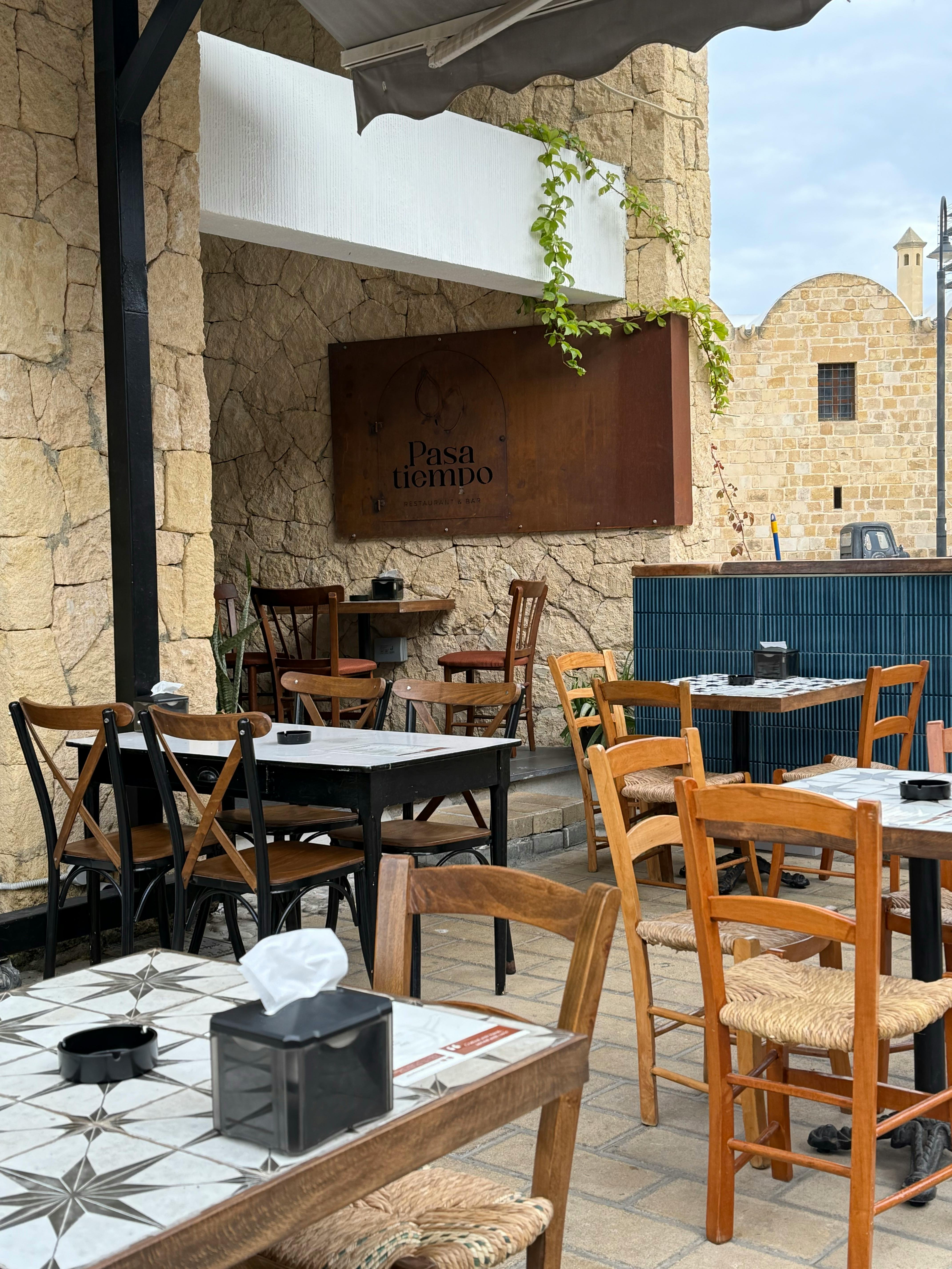 Charming Outdoor Cafe with Rustic Decor · Free Stock Photo