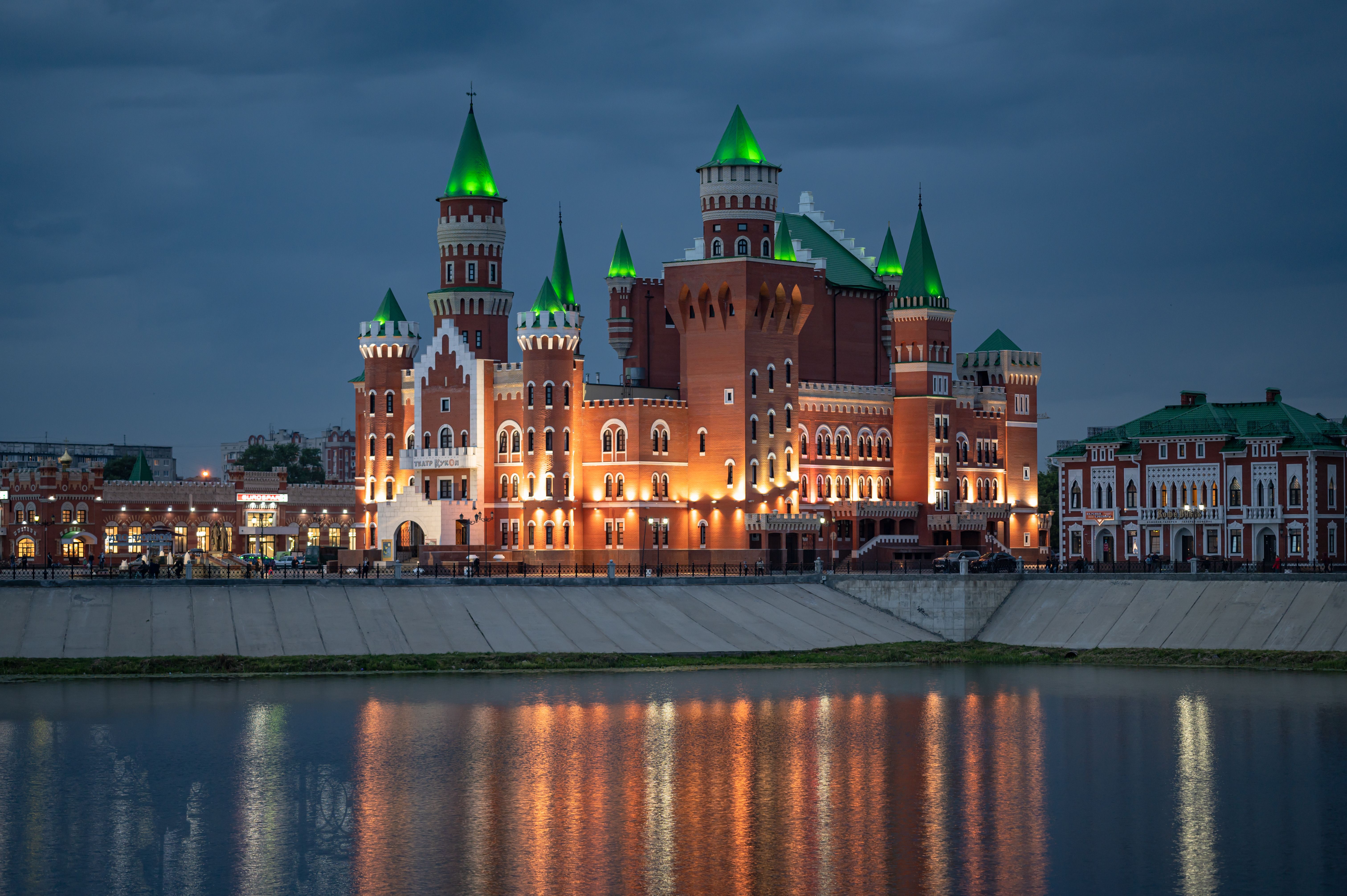 Illuminated Castle at Night by the River · Free Stock Photo