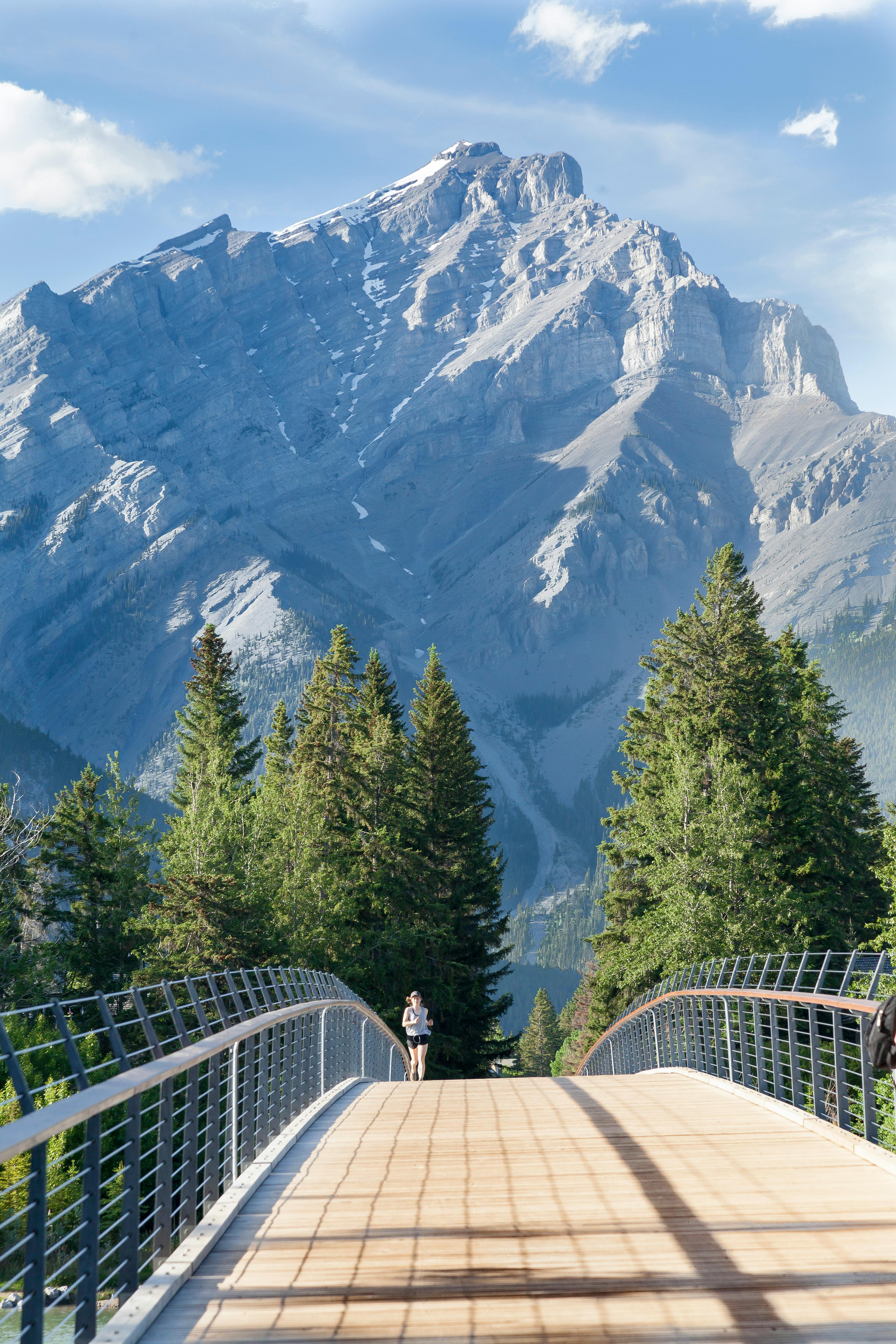 Scenic View of Banff National Park Bridge and Mountains · Free Stock Photo