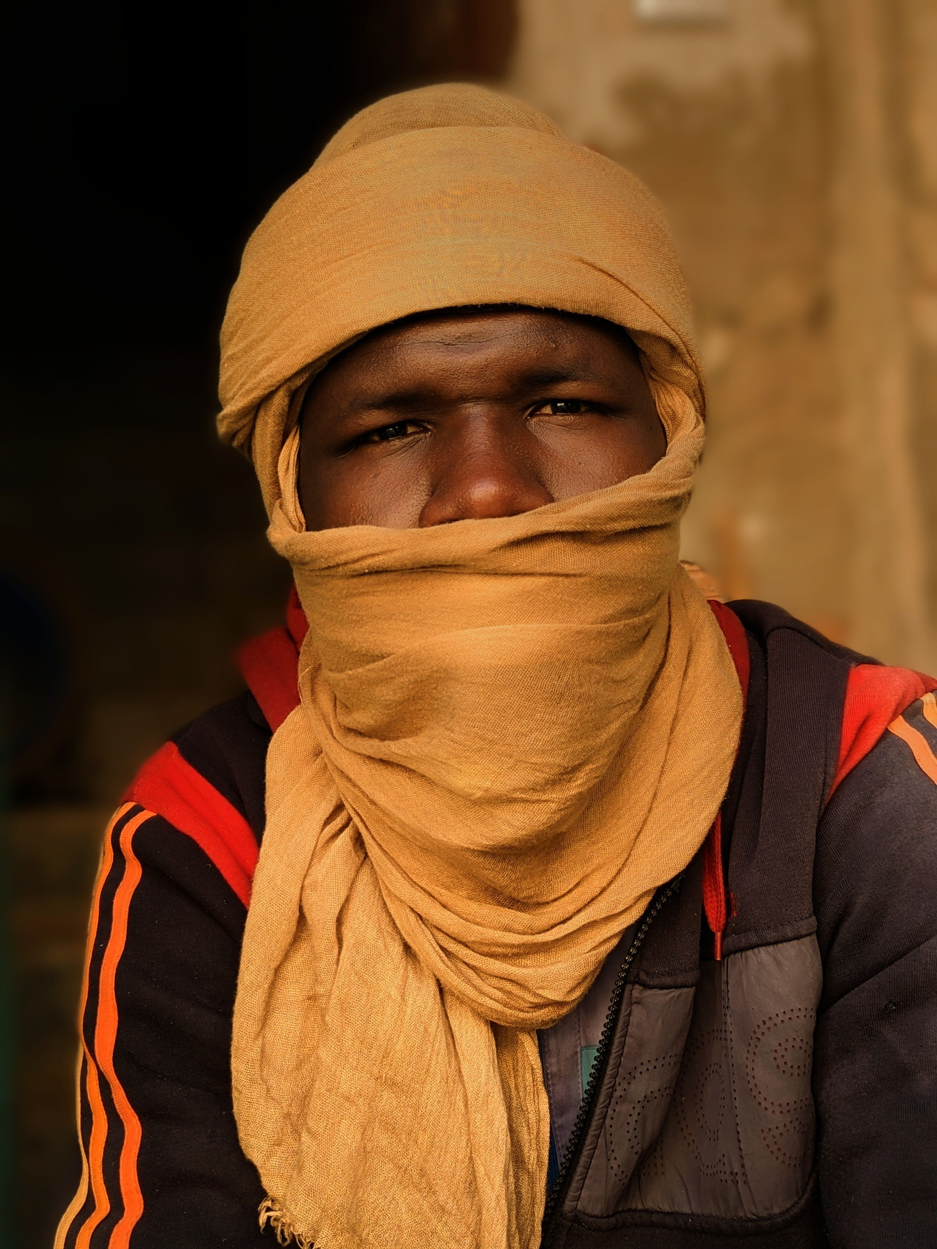 Portrait of Man in Traditional Desert Attire · Free Stock Photo