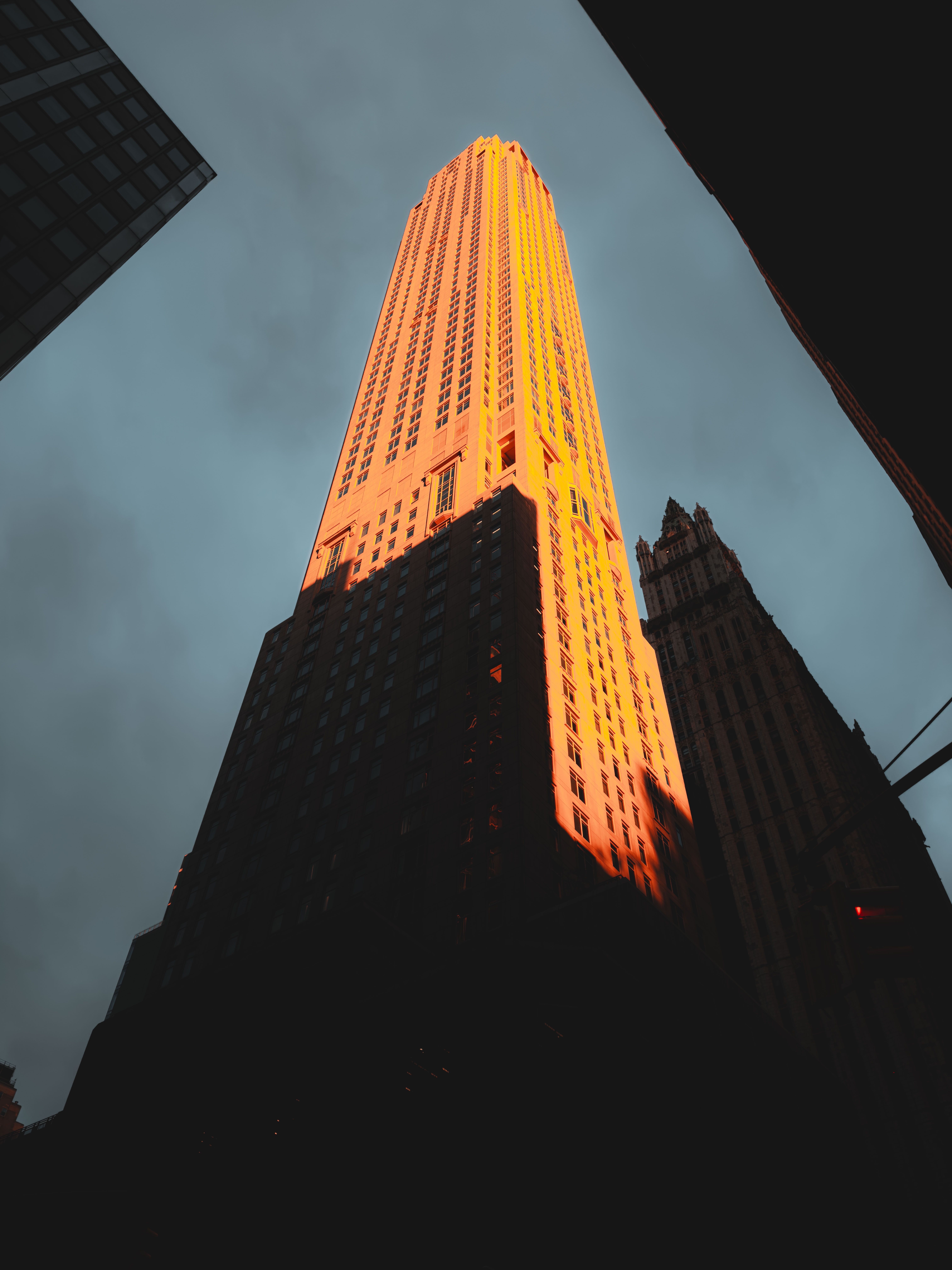 Skyscraper Illuminated at Sunset in Urban Landscape · Free Stock Photo
