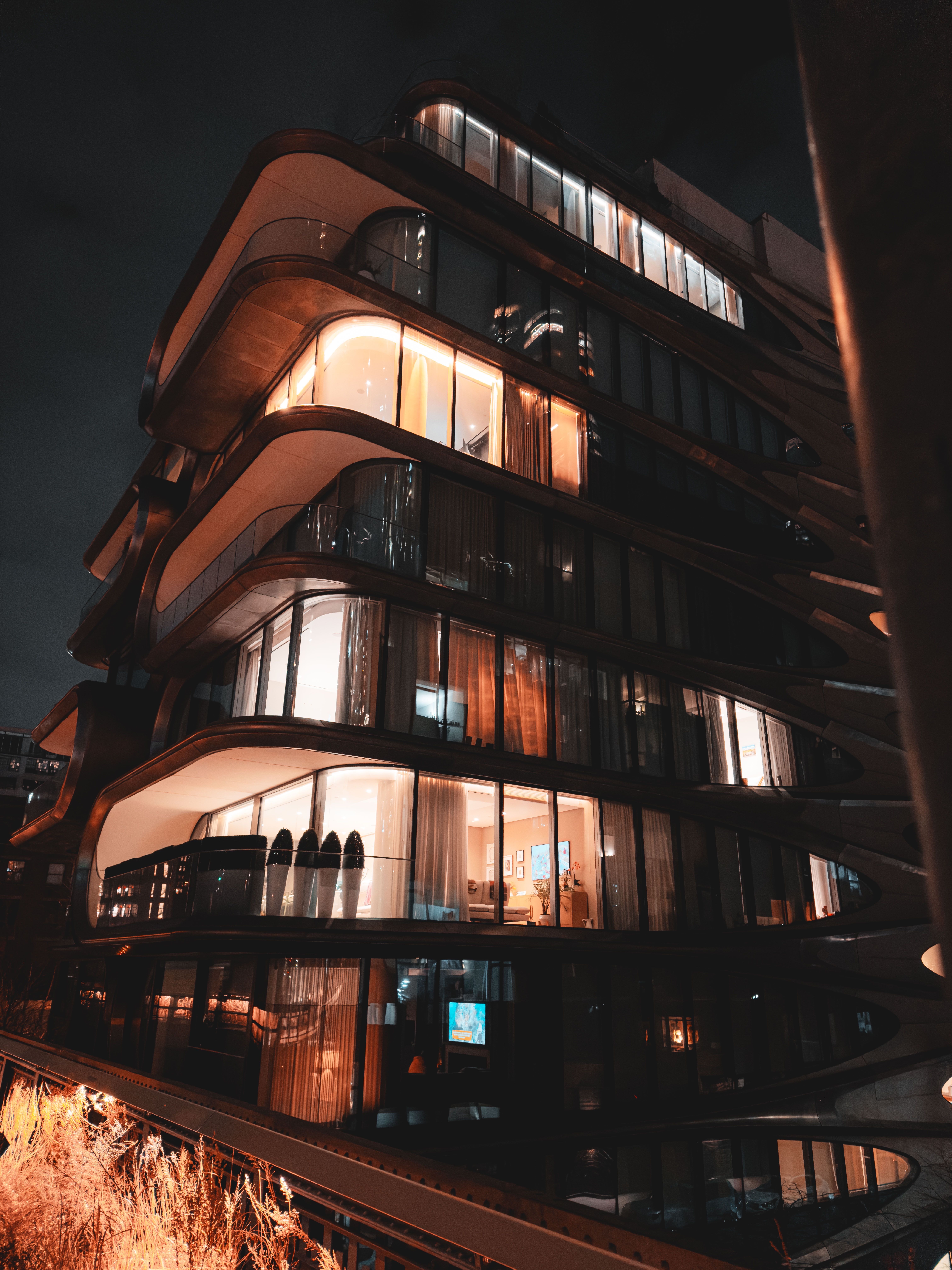Modern Curved Architecture Building at Night · Free Stock Photo
