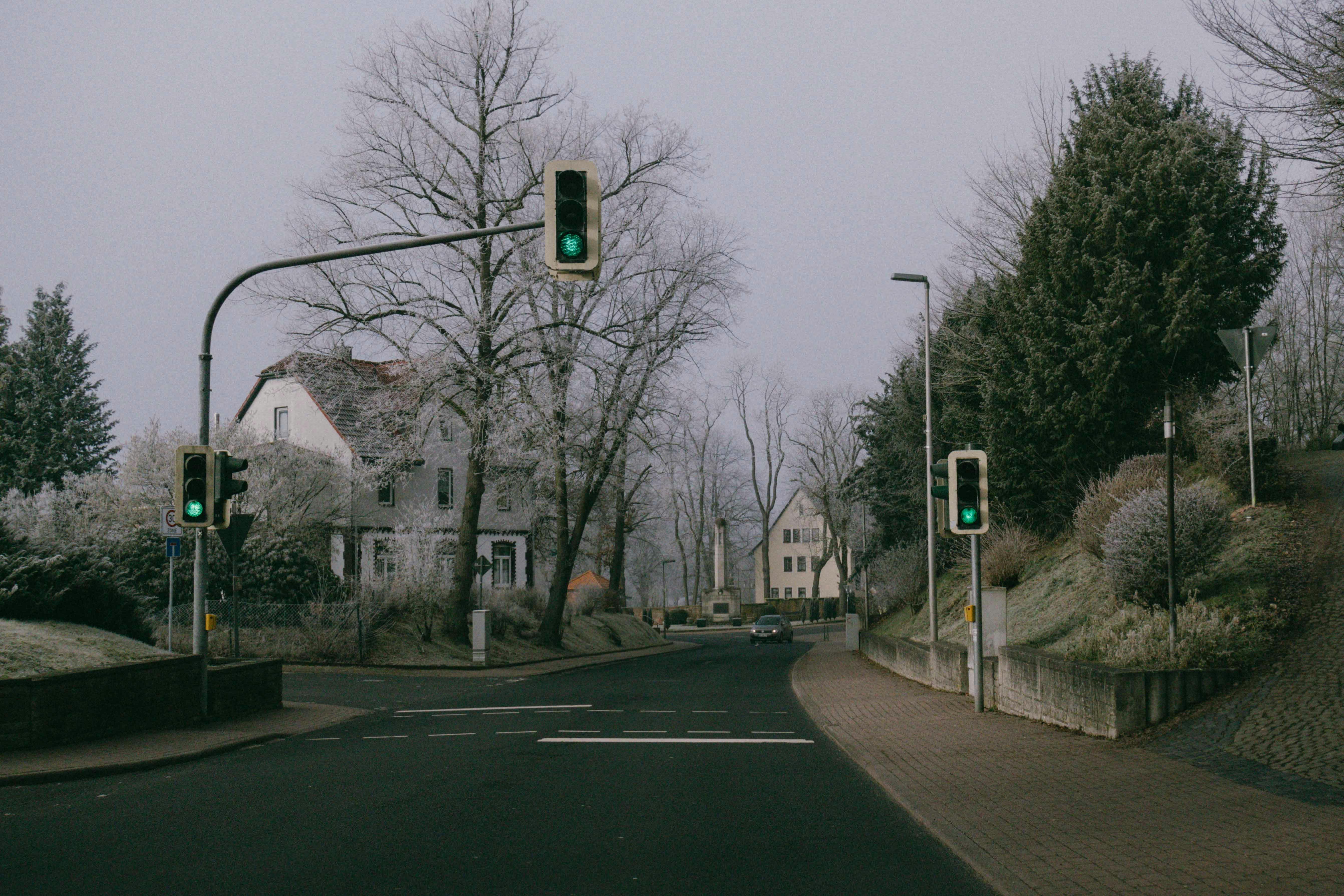 Foggy Rural Intersection with Green Traffic Light · Free Stock Photo