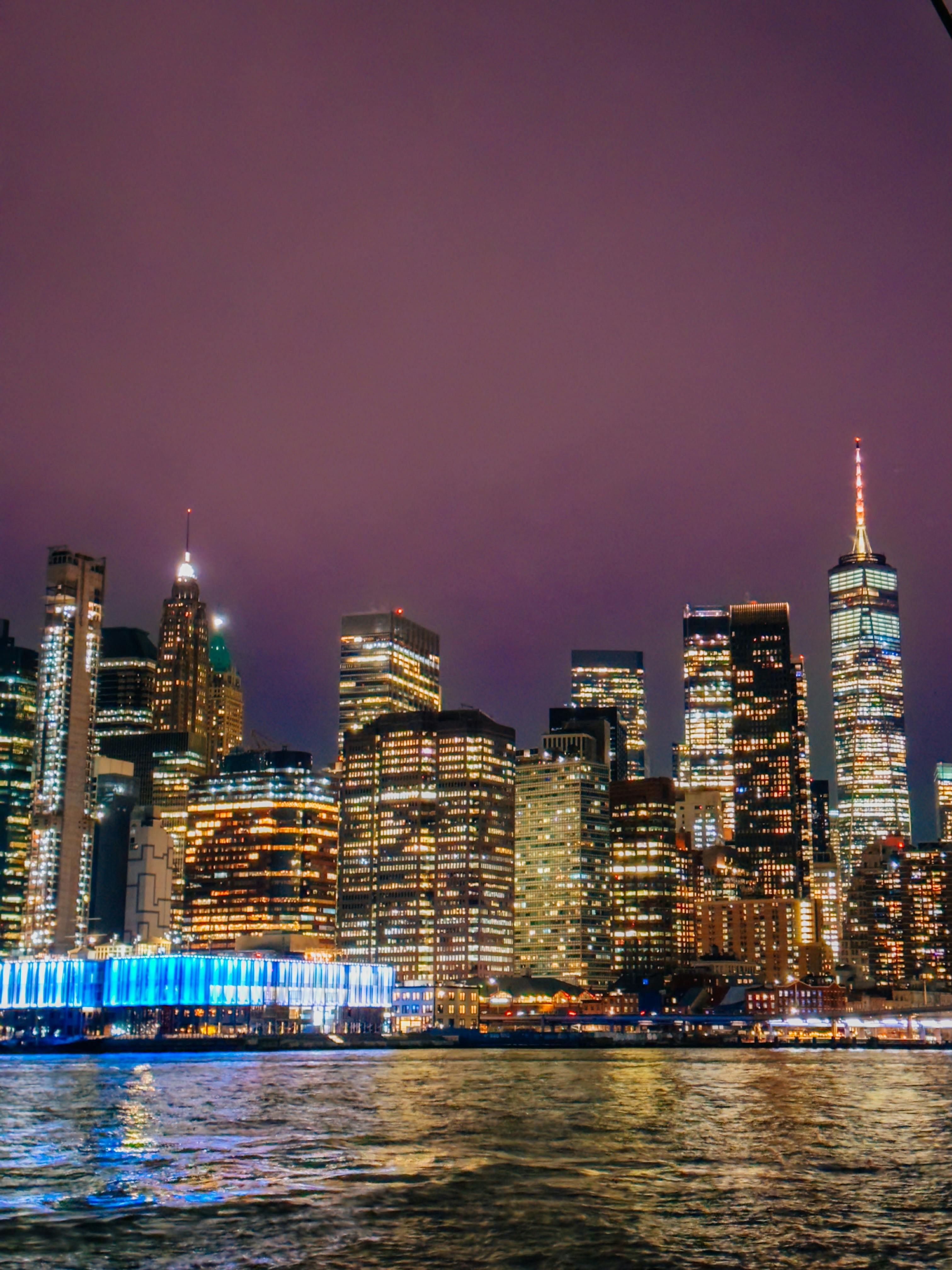 New York City Skyline at Night with Illuminated Buildings · Free Stock ...
