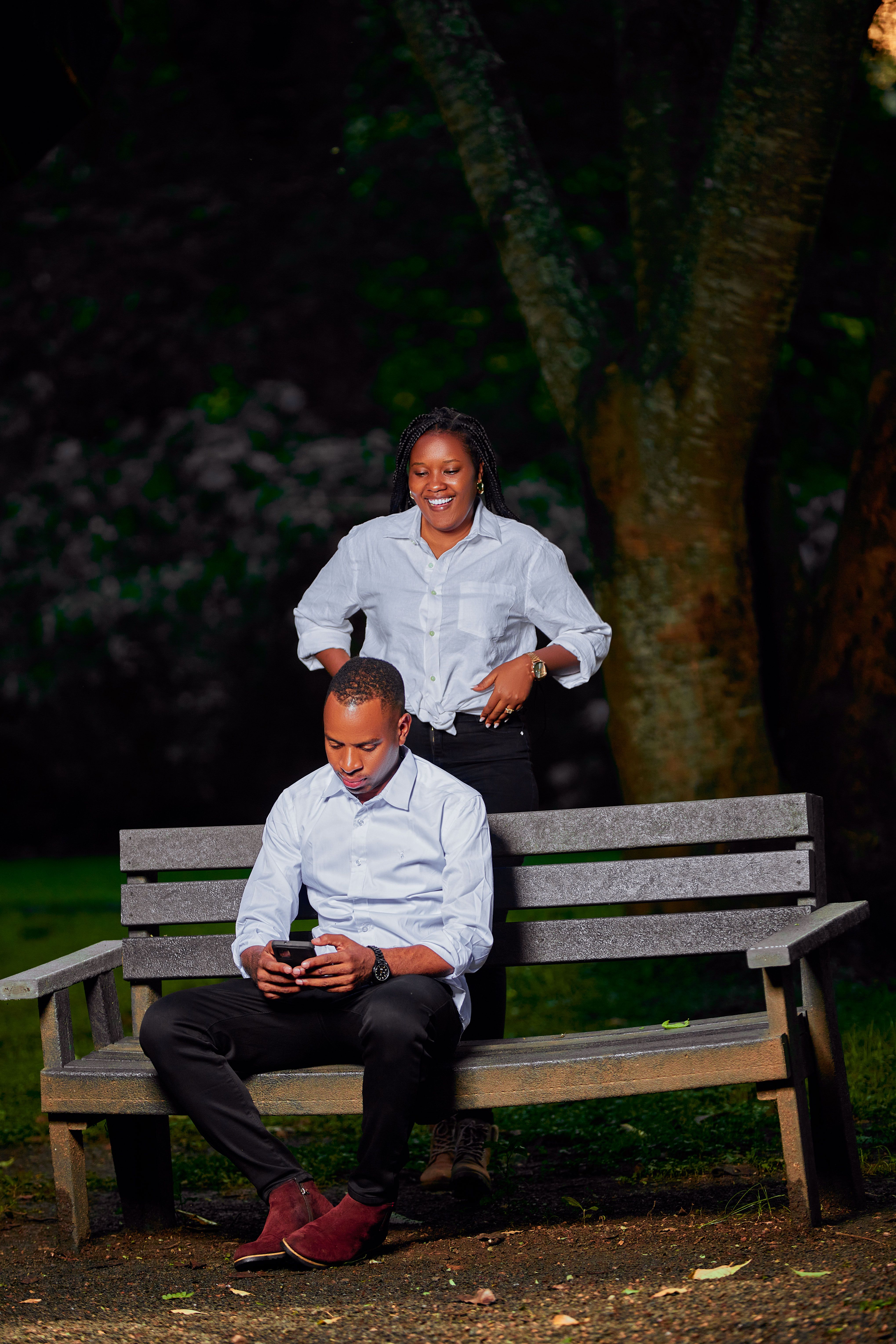 Casual Park Scene with Two Adults Interacting · Free Stock Photo