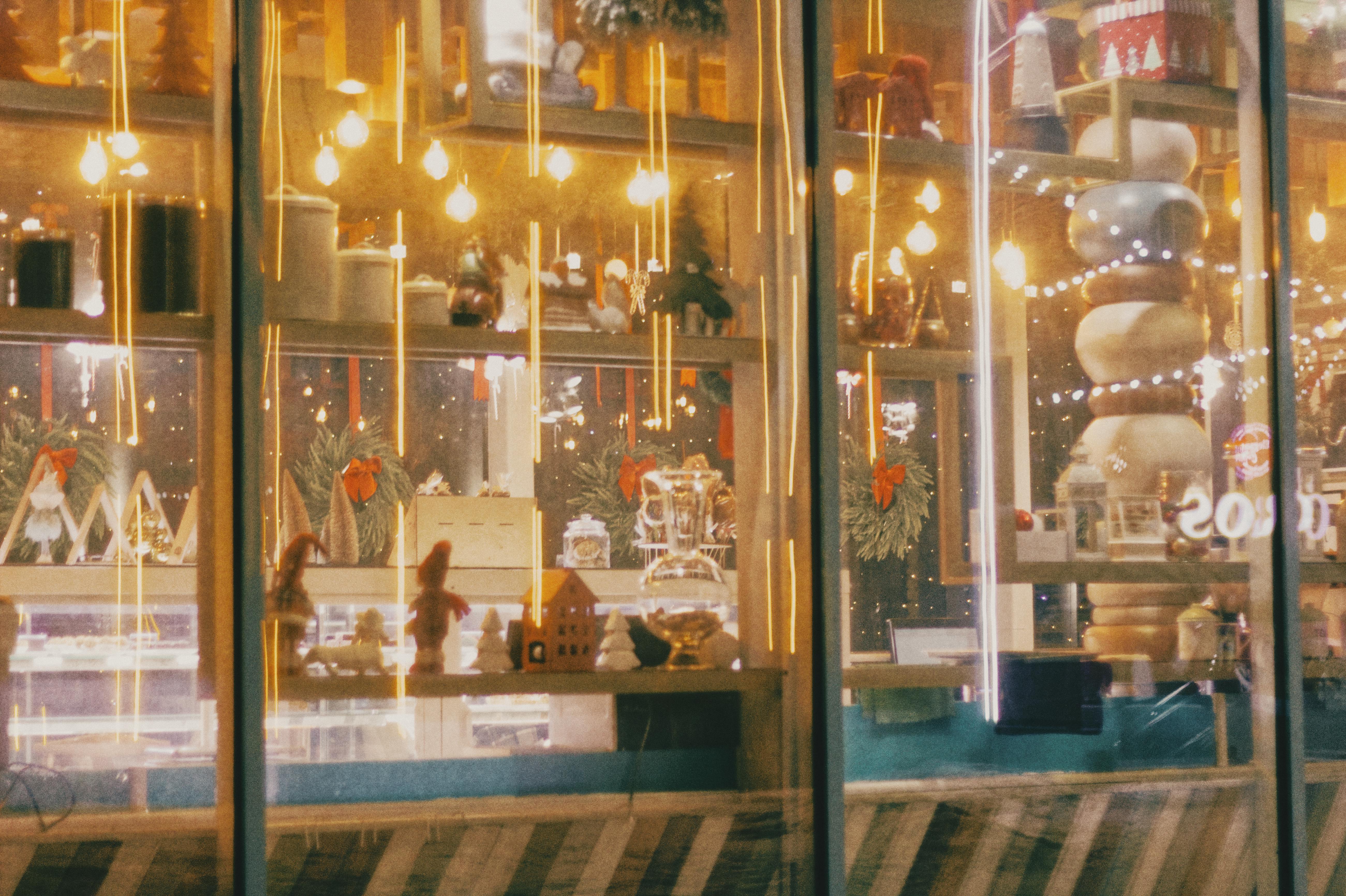 Festive Window Display with Cozy Holiday Decor · Free Stock Photo