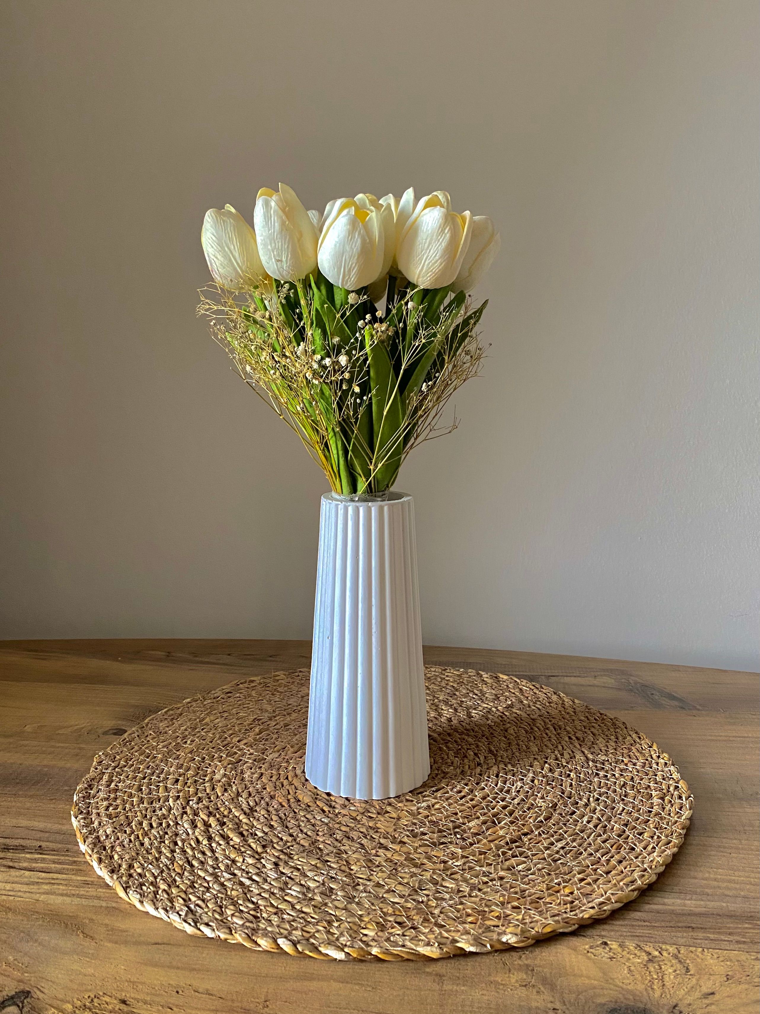 Elegant White Tulips in Tall Fluted Vase · Free Stock Photo