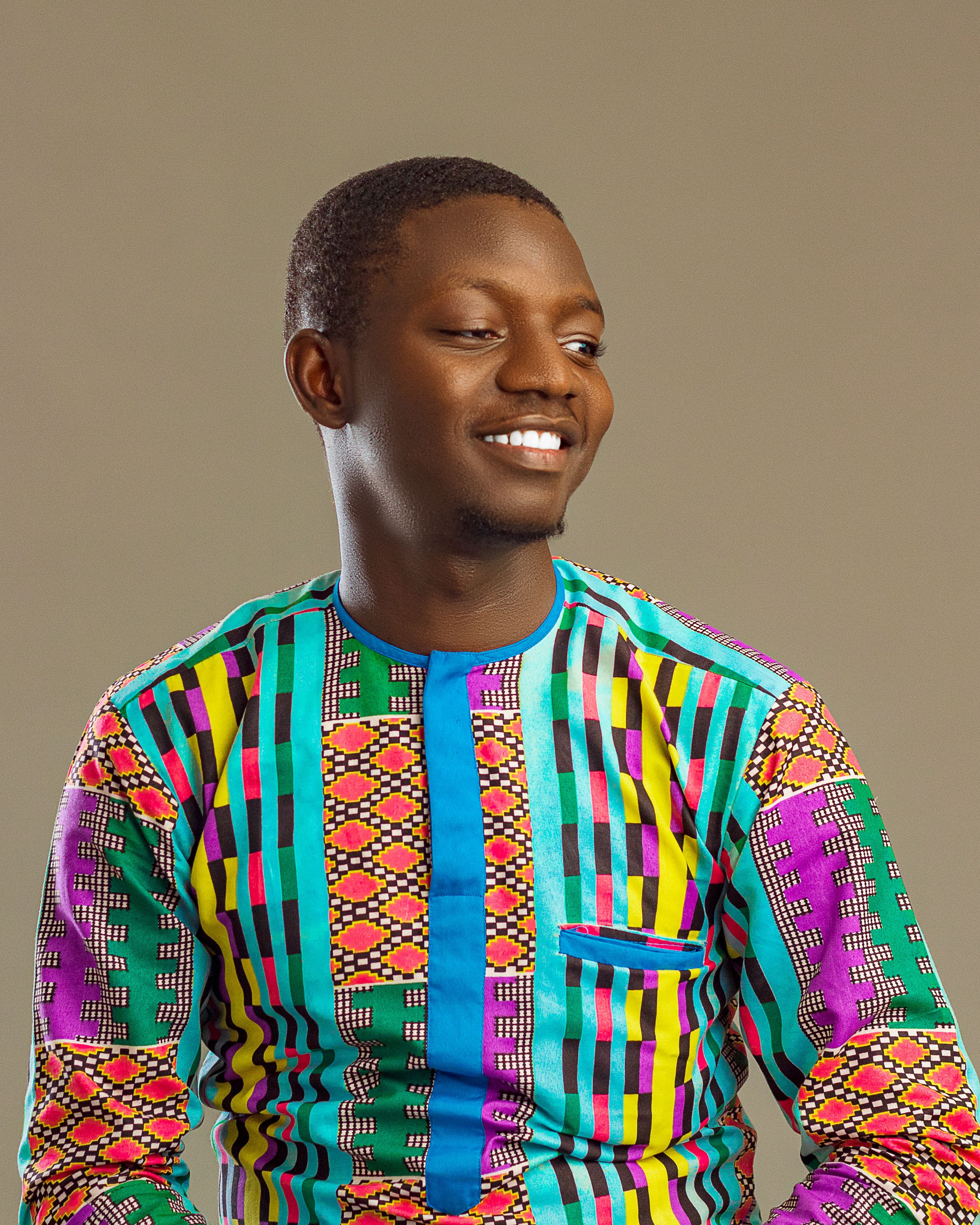 Colorful African Attire Portrait in Abuja · Free Stock Photo