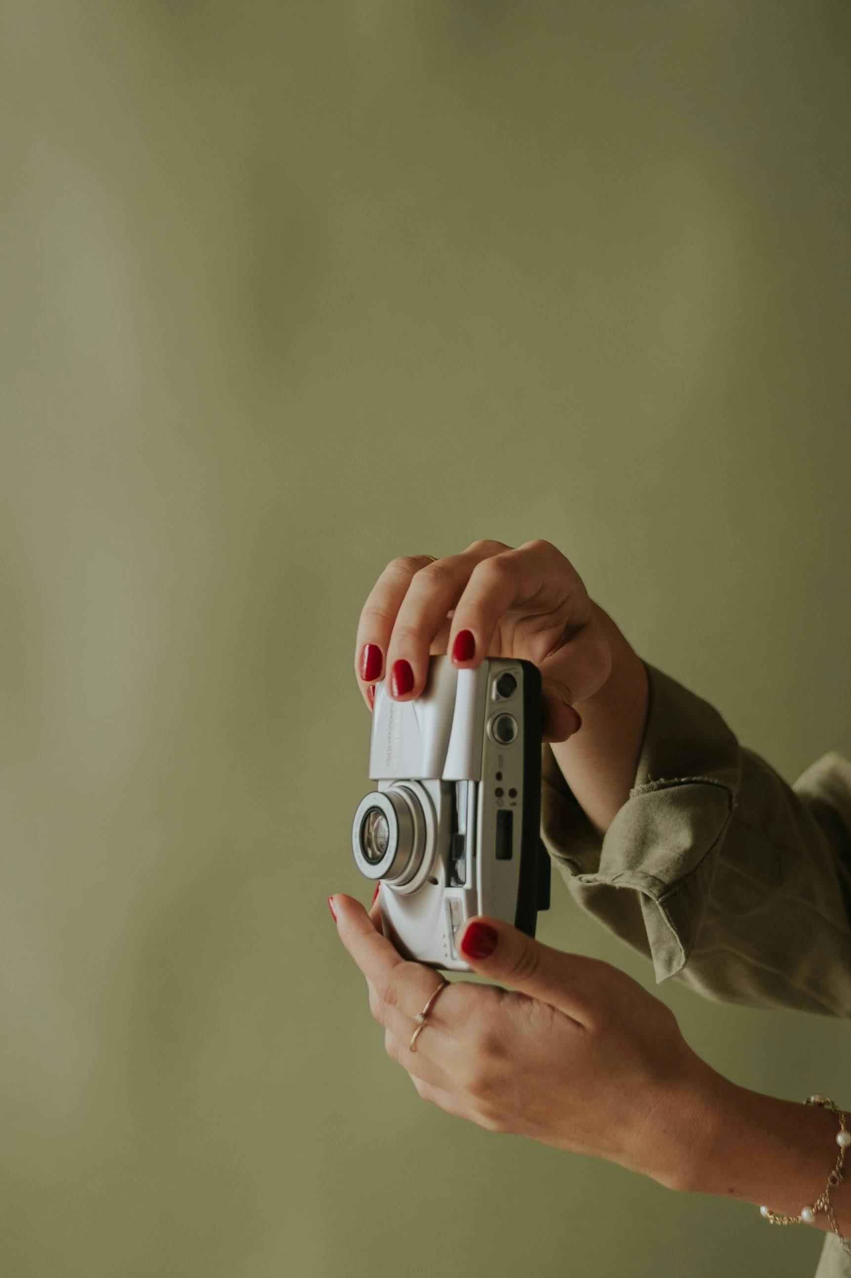 Close-up of Hands Holding Vintage Camera · Free Stock Photo