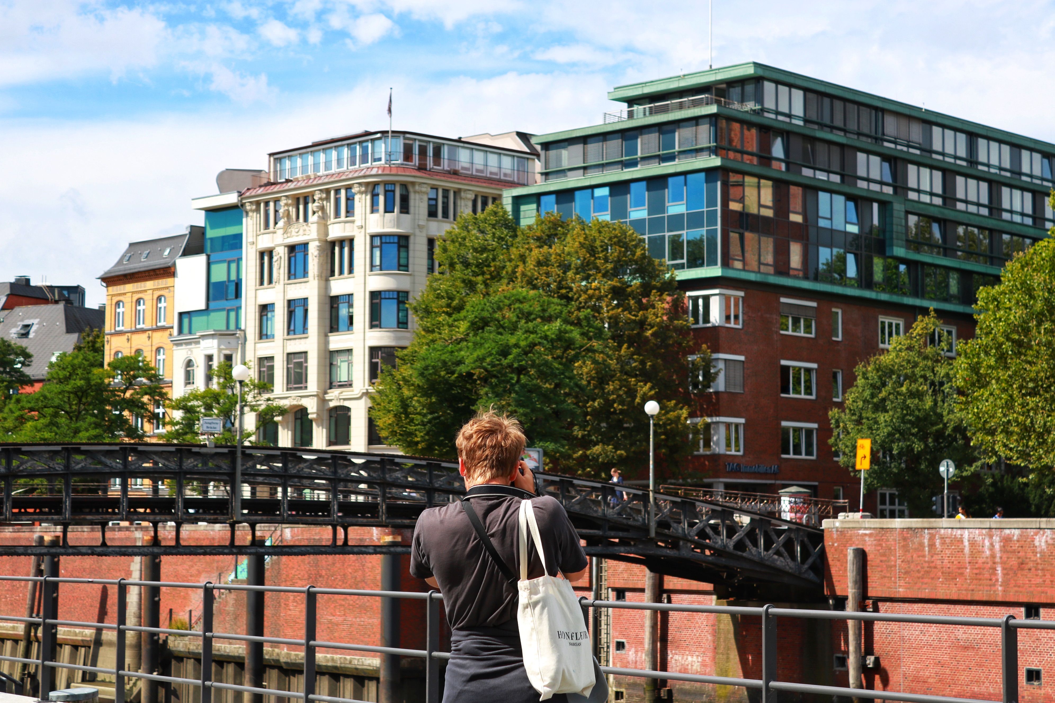 Photographer Capturing Urban Architecture Scene · Free Stock Photo